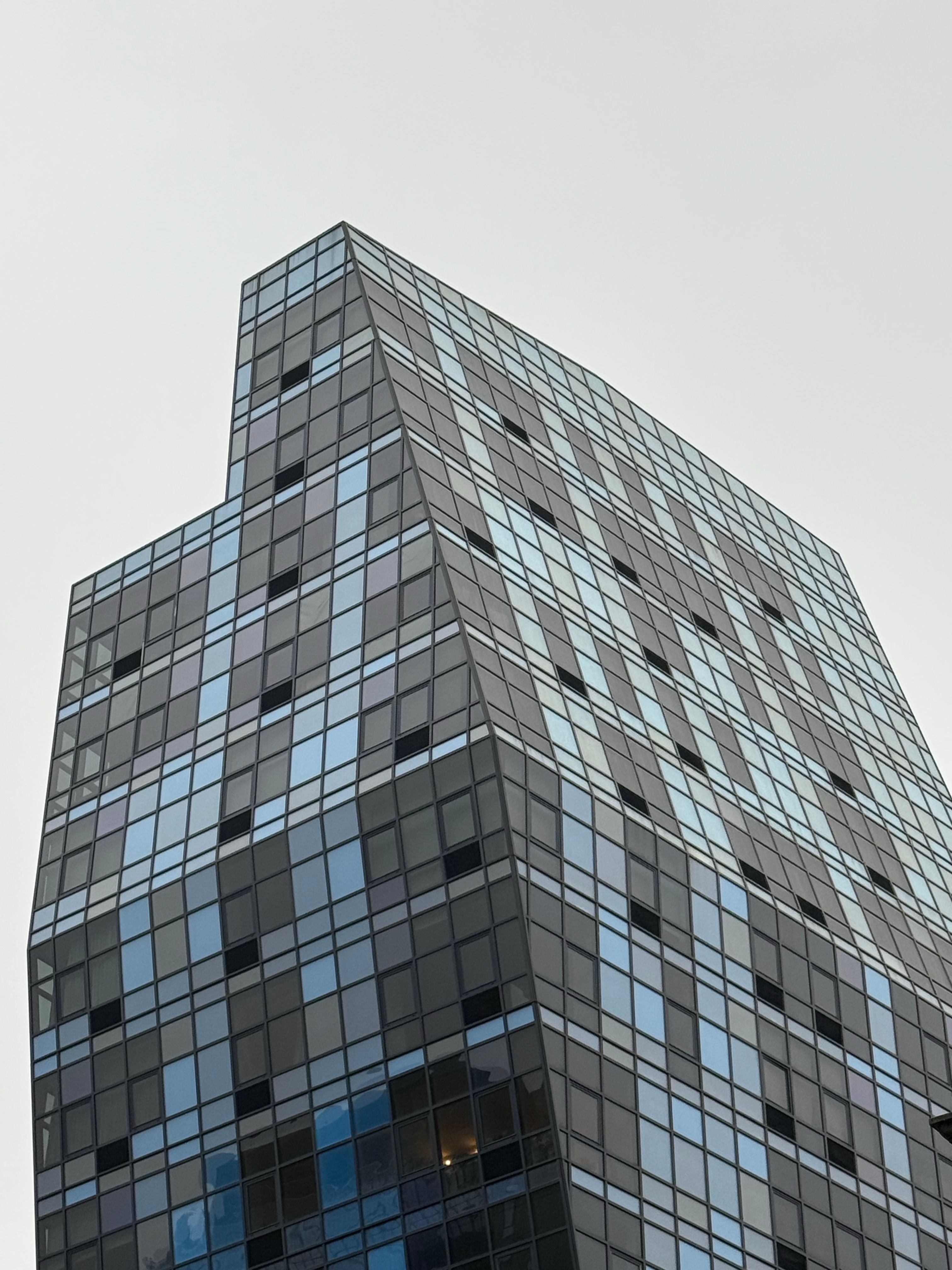 Modern Geometric Glass Skyscraper Architecture · Free Stock Photo