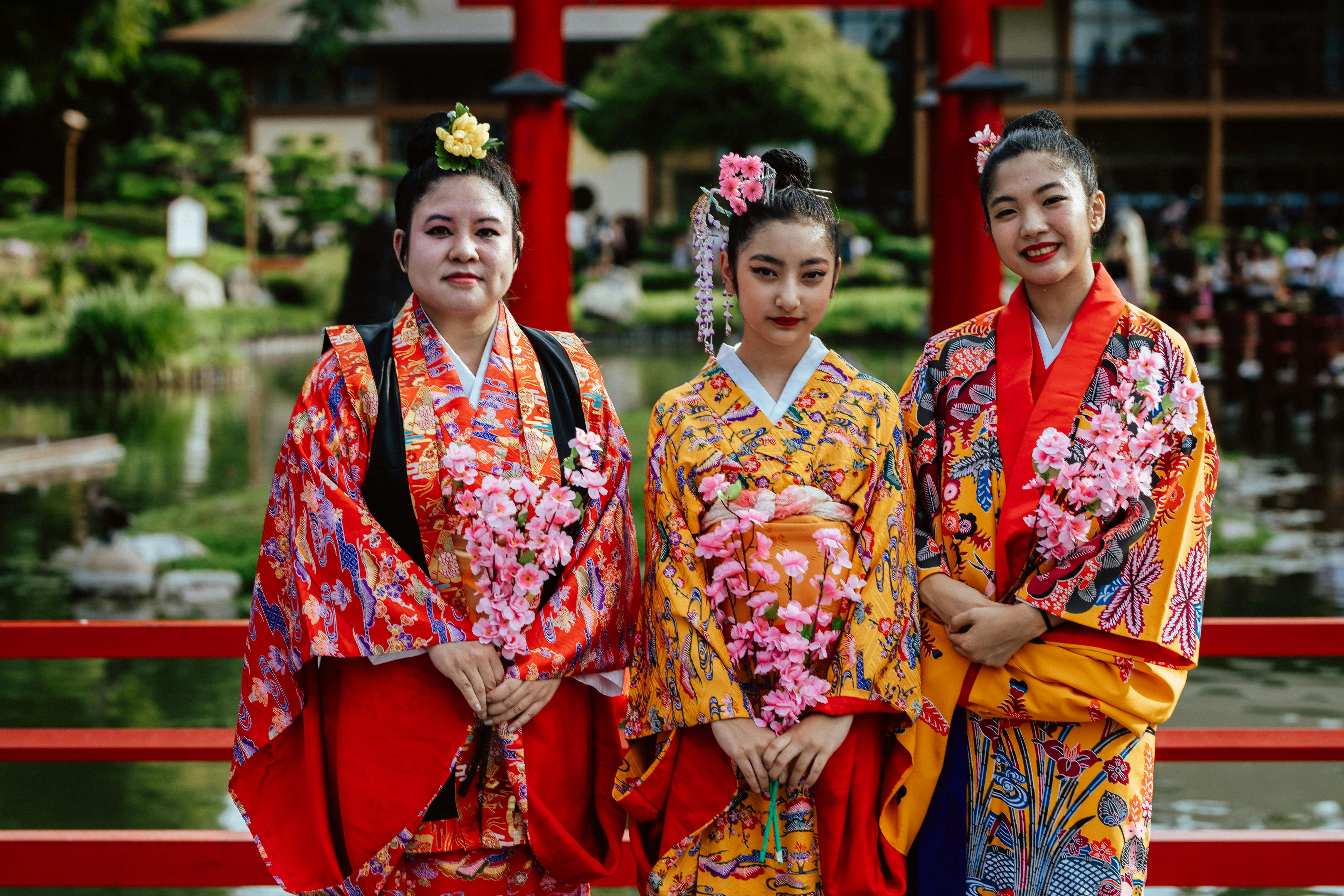 Women in Colorful Kimonos by Japanese Garden · Free Stock Photo