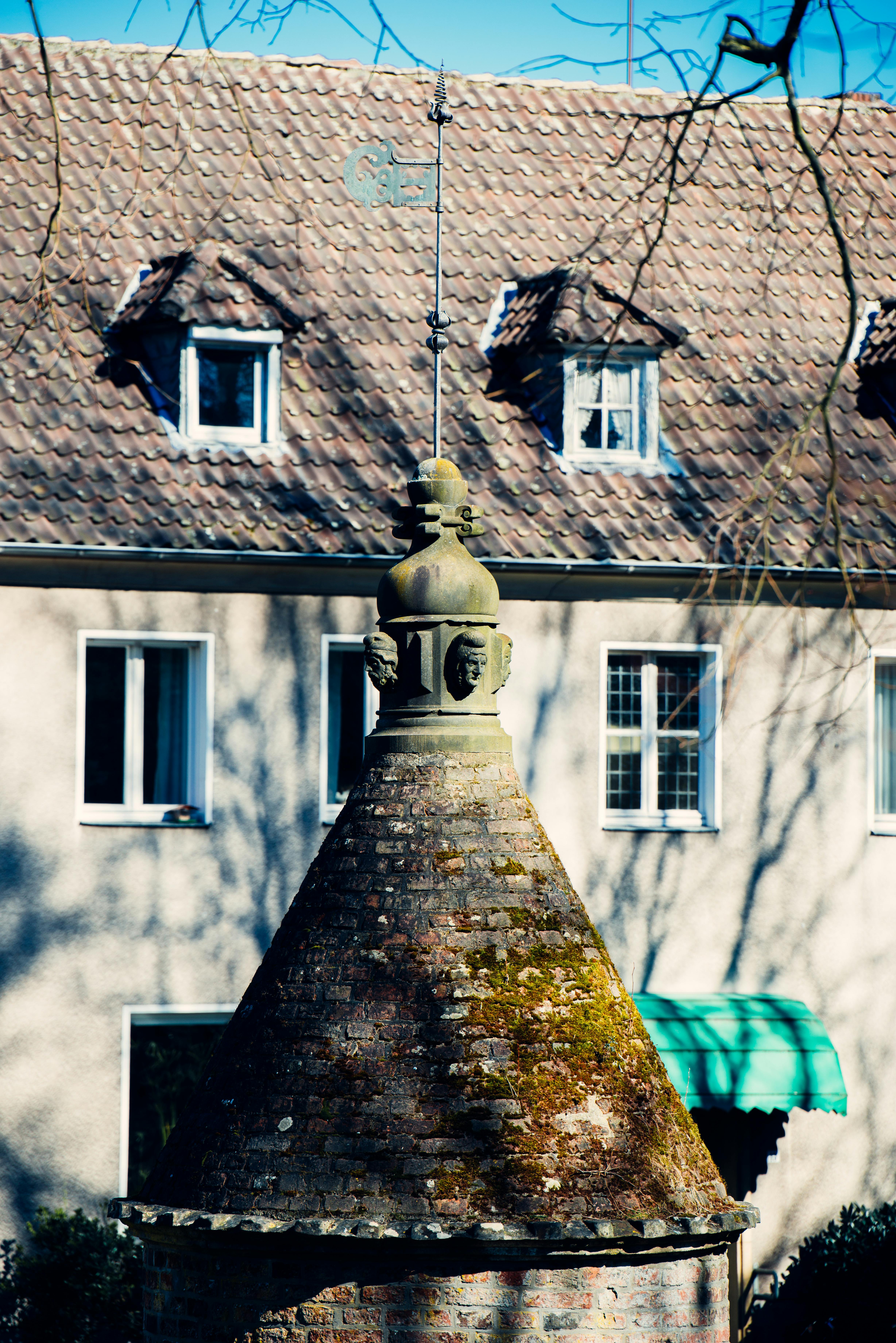Historic Architectural Detail of Brick Turret · Free Stock Photo