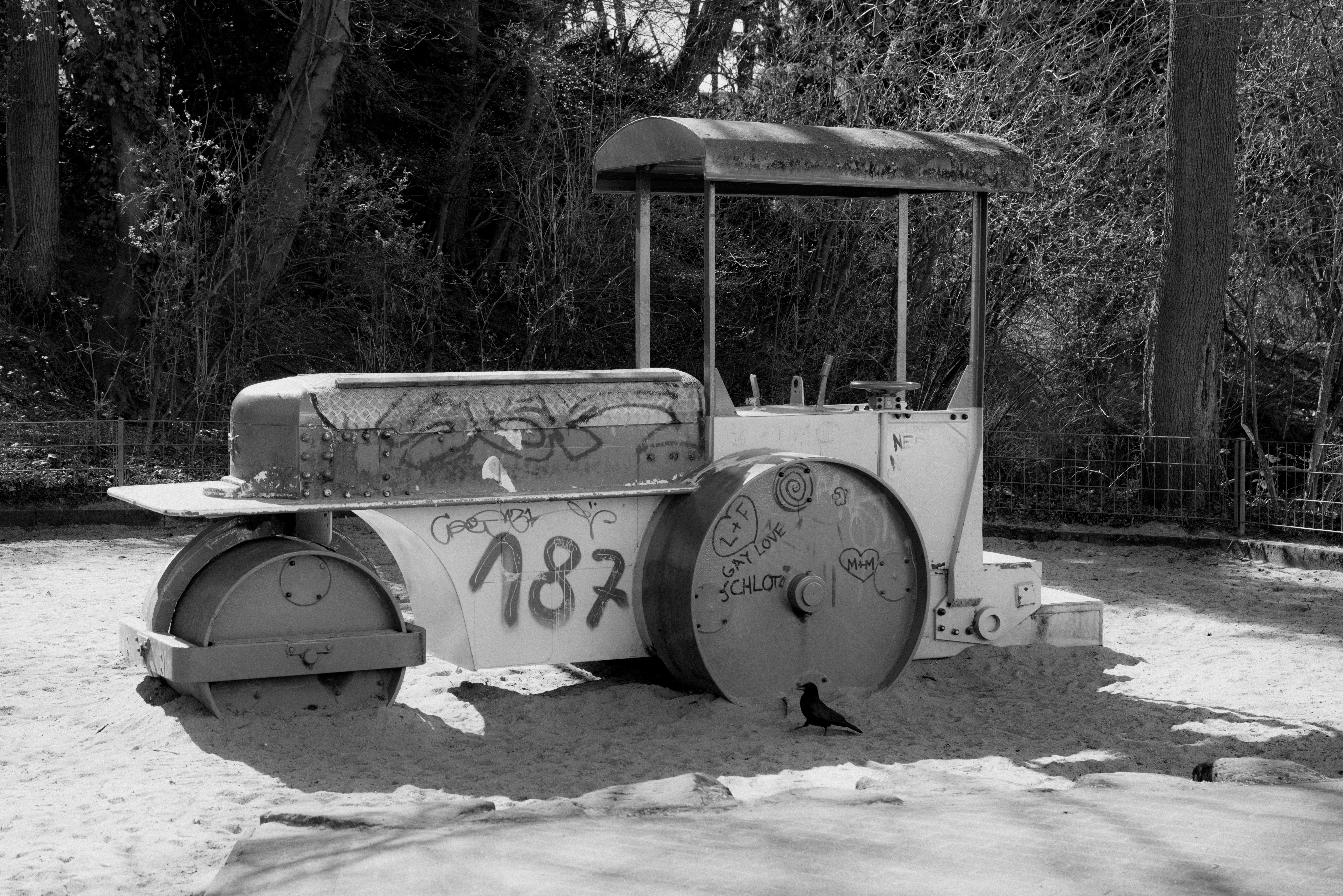 Vintage Steamroller with Graffiti in Black and White · Free Stock Photo