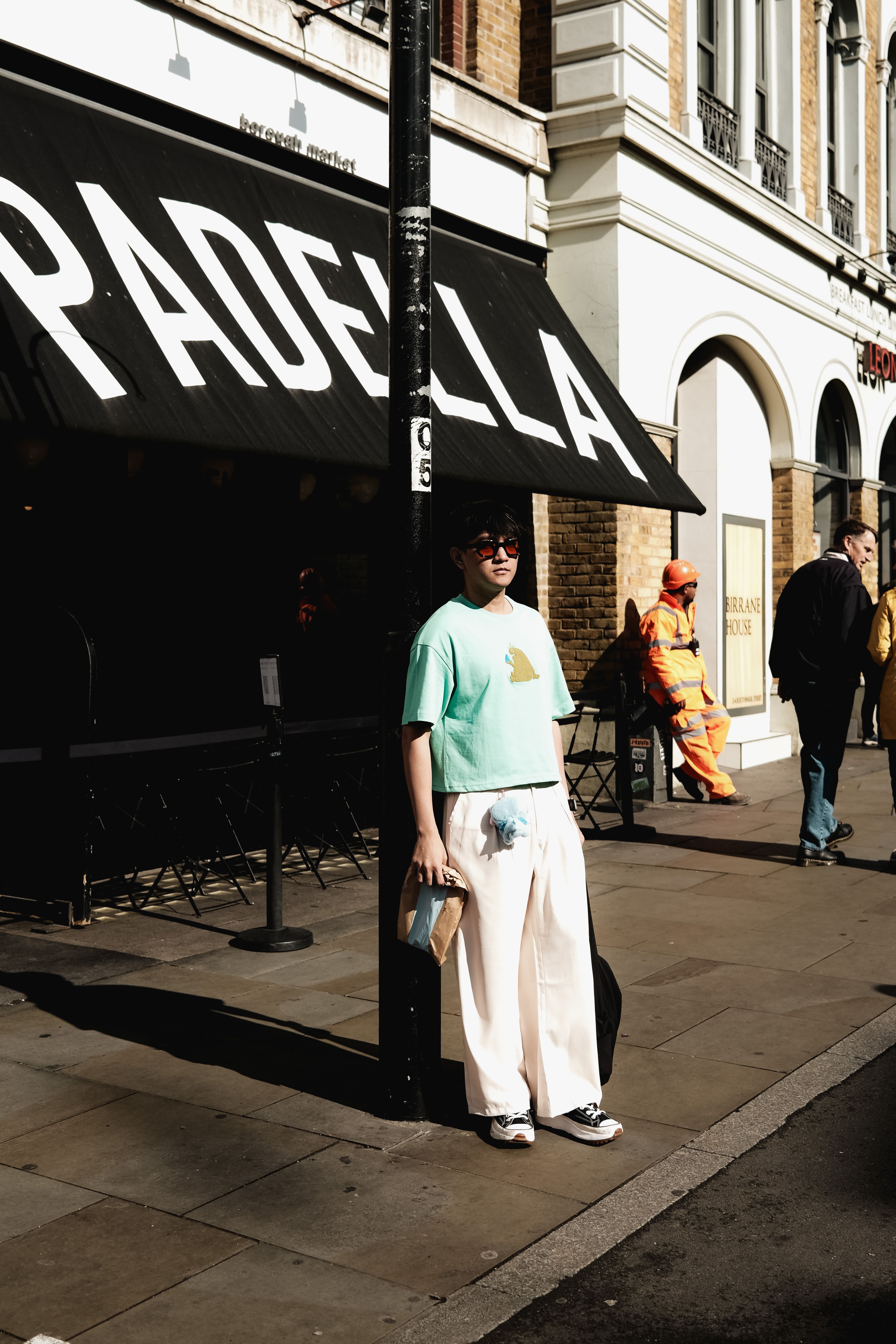 Person Standing Outside Padella Restaurant · Free Stock Photo