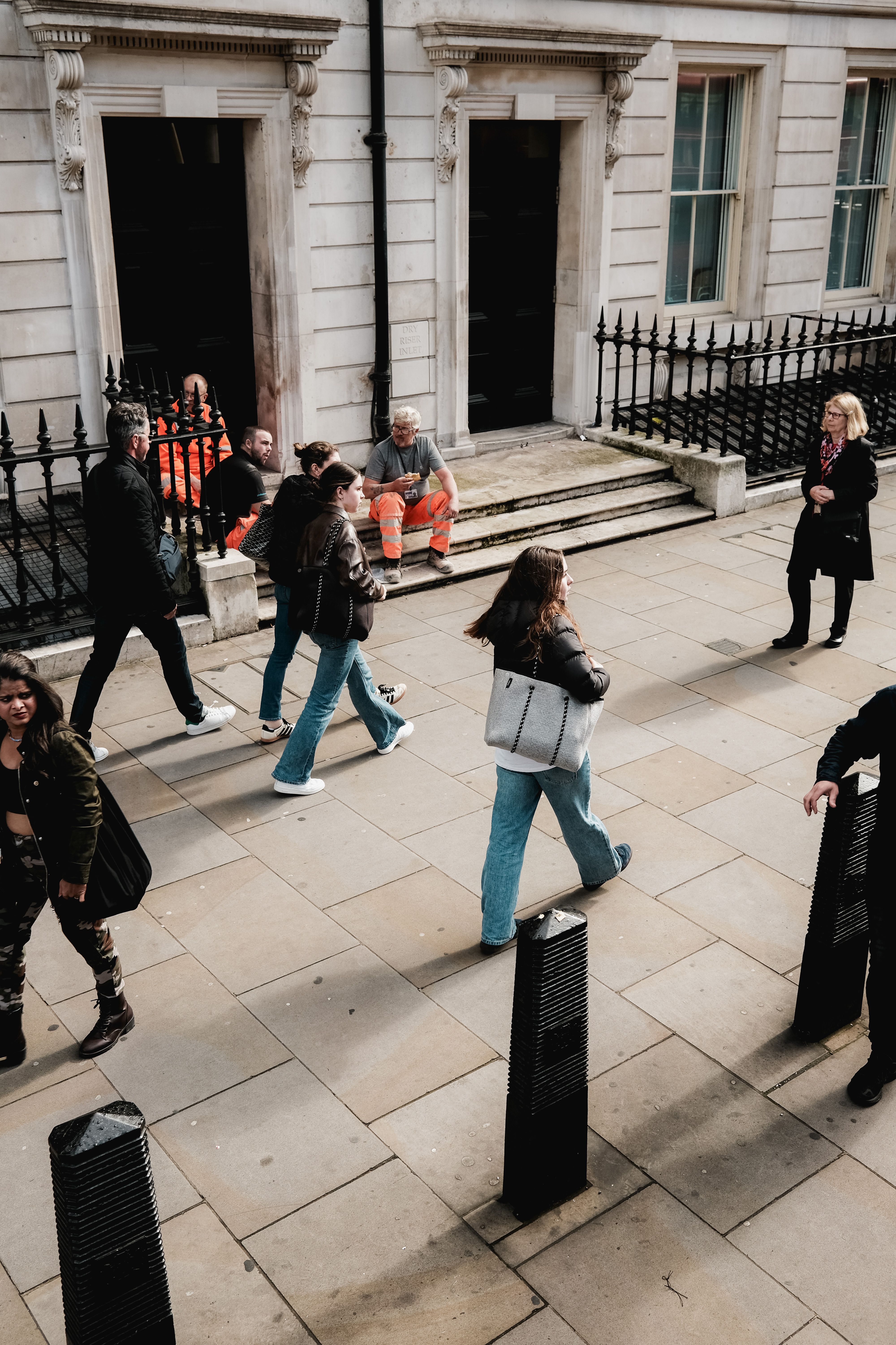 Busy City Street Scene with Pedestrians · Free Stock Photo