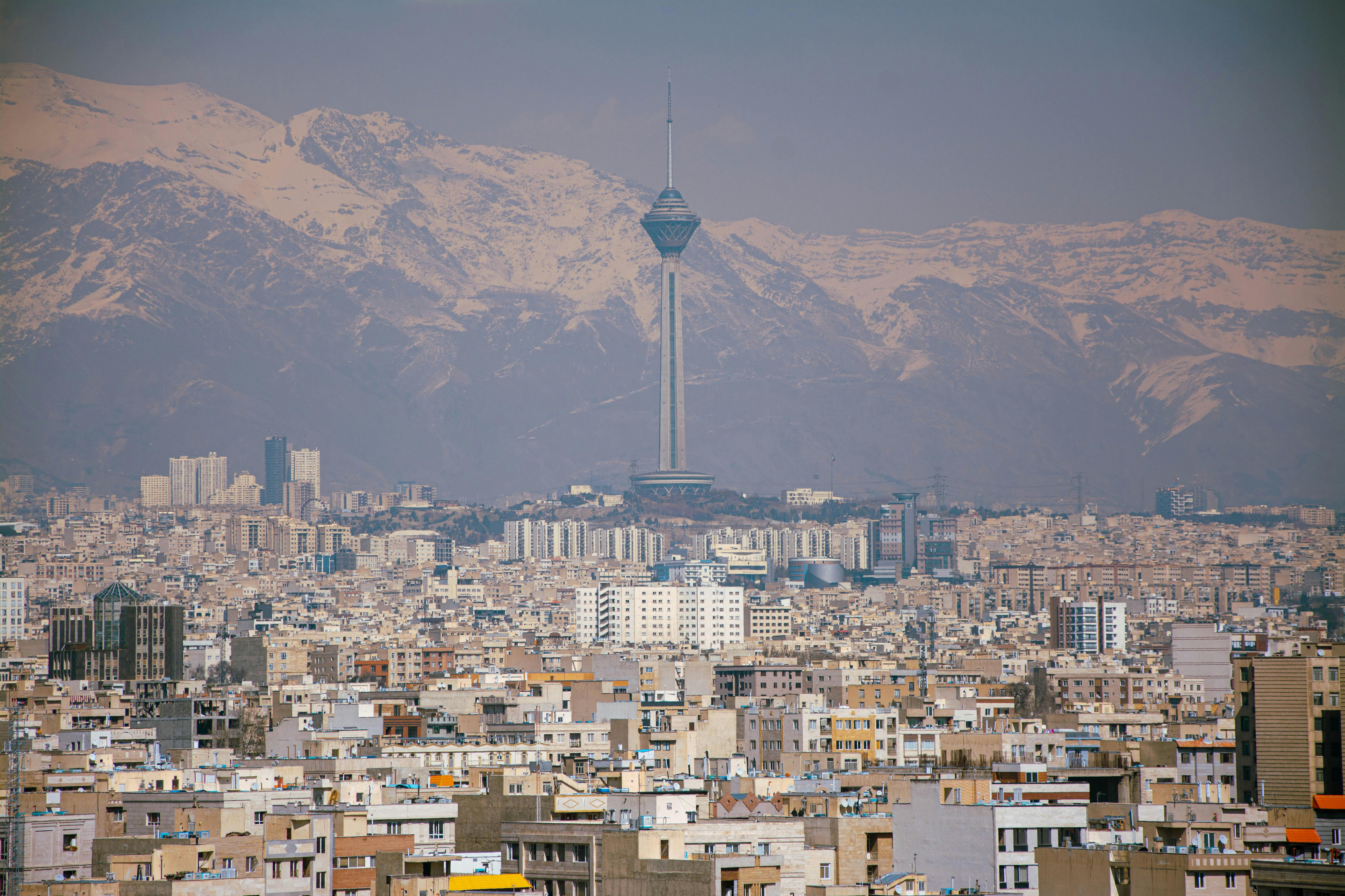 Milad Tower and Tehran Cityscape with Alborz Mountains · Free Stock Photo
