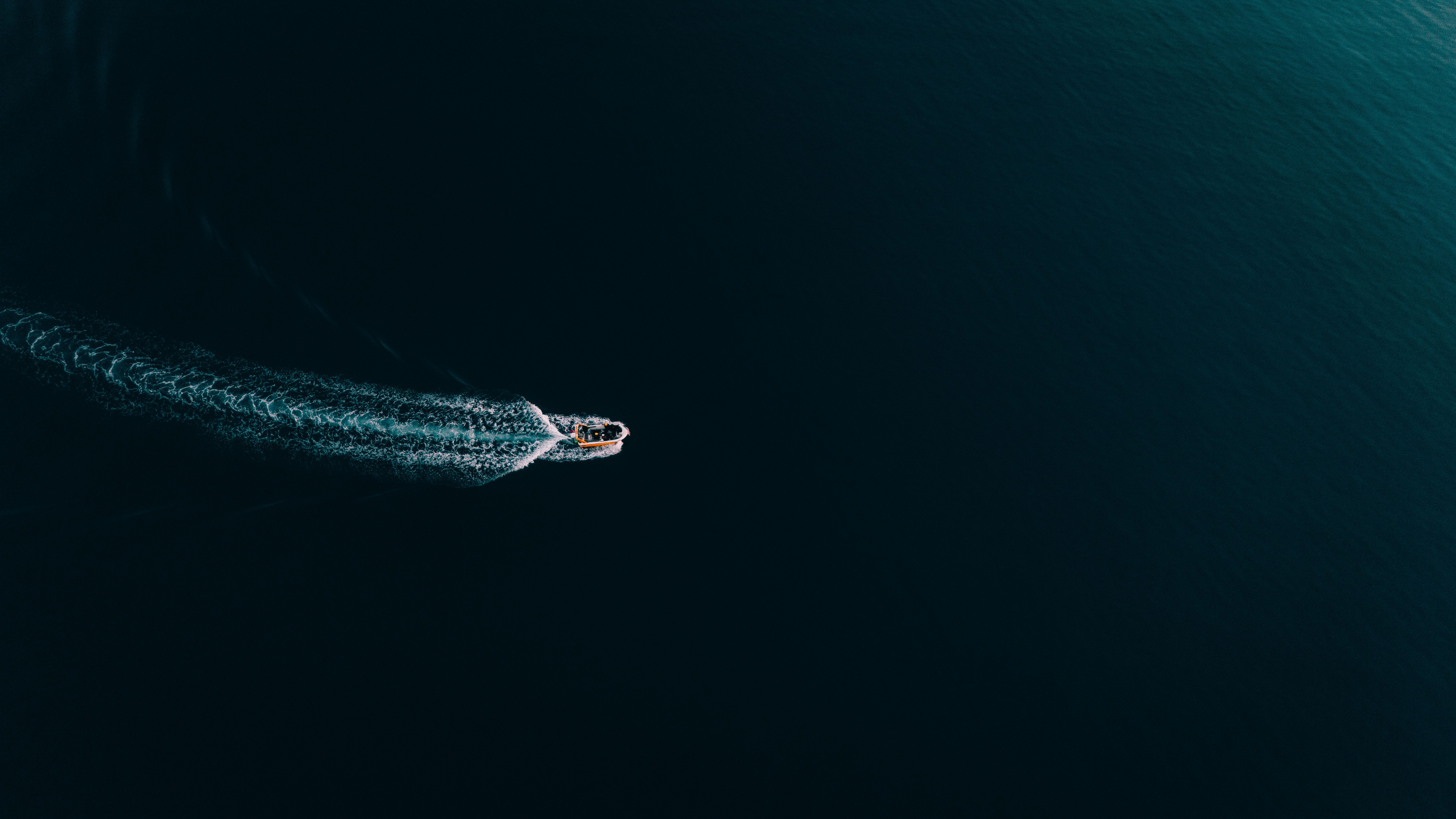 Aerial View of Speedboat on Deep Blue Waters · Free Stock Photo