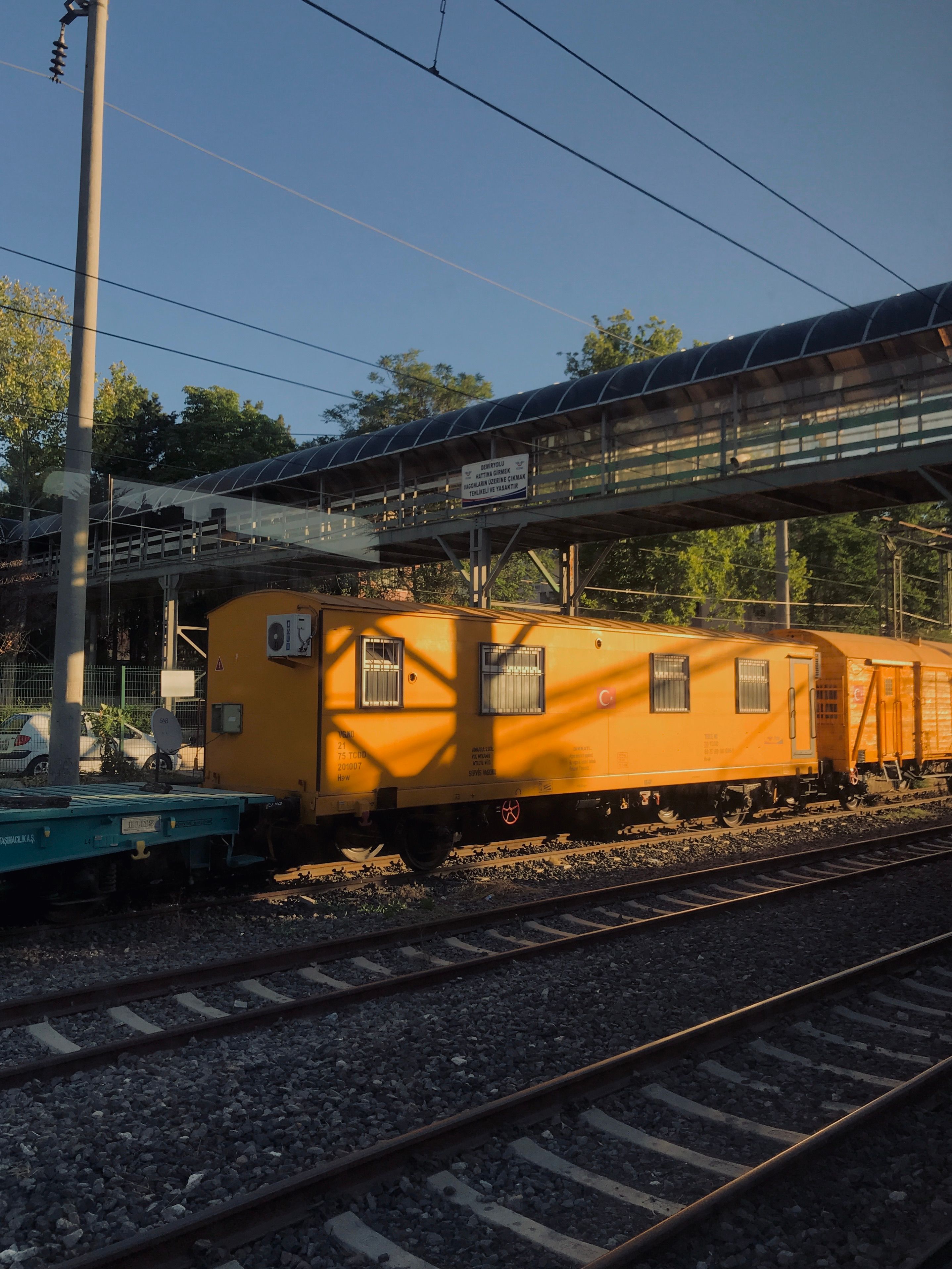 Yellow Railway Maintenance Train at Station · Free Stock Photo