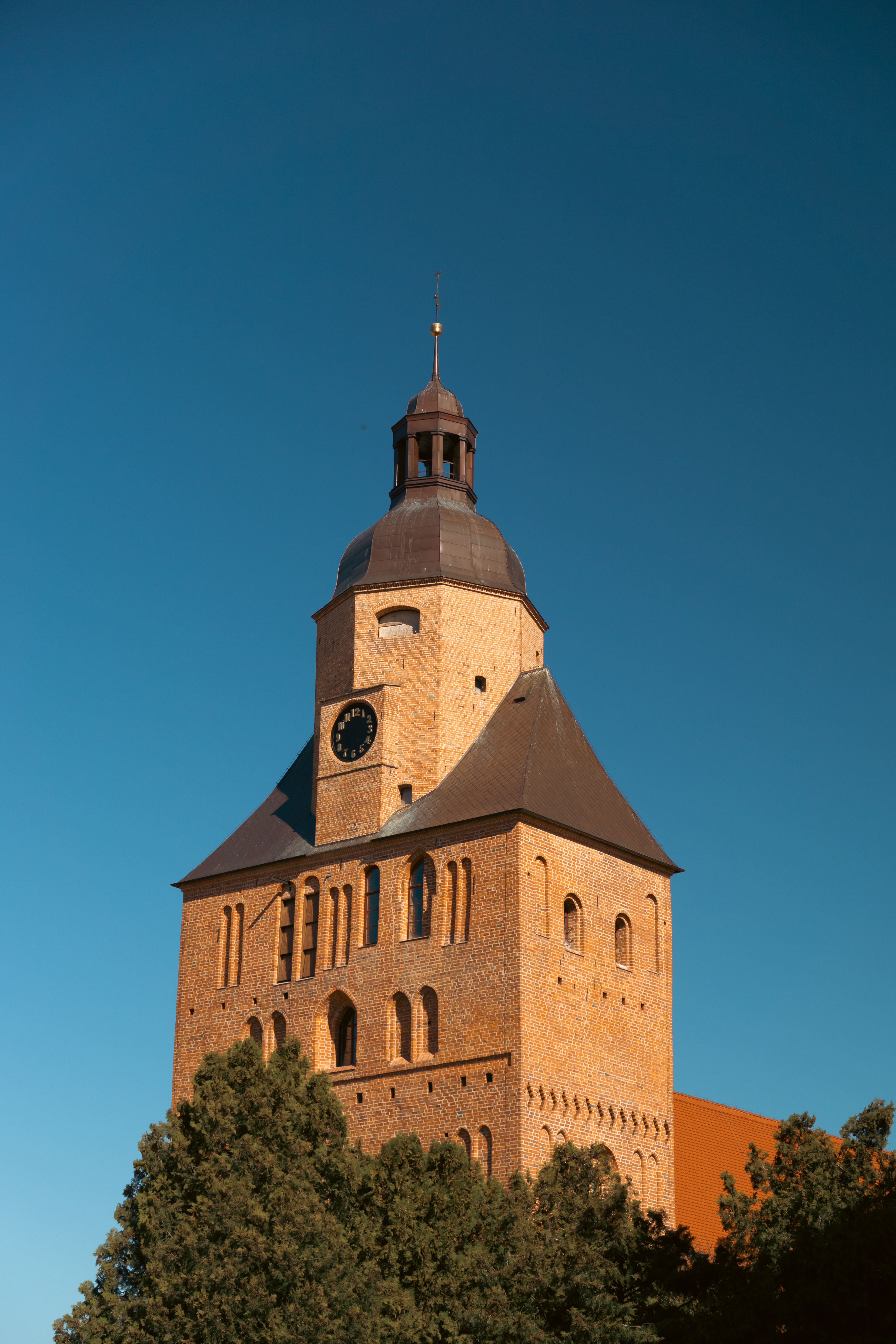 Historic European Clock Tower Against Blue Sky · Free Stock Photo