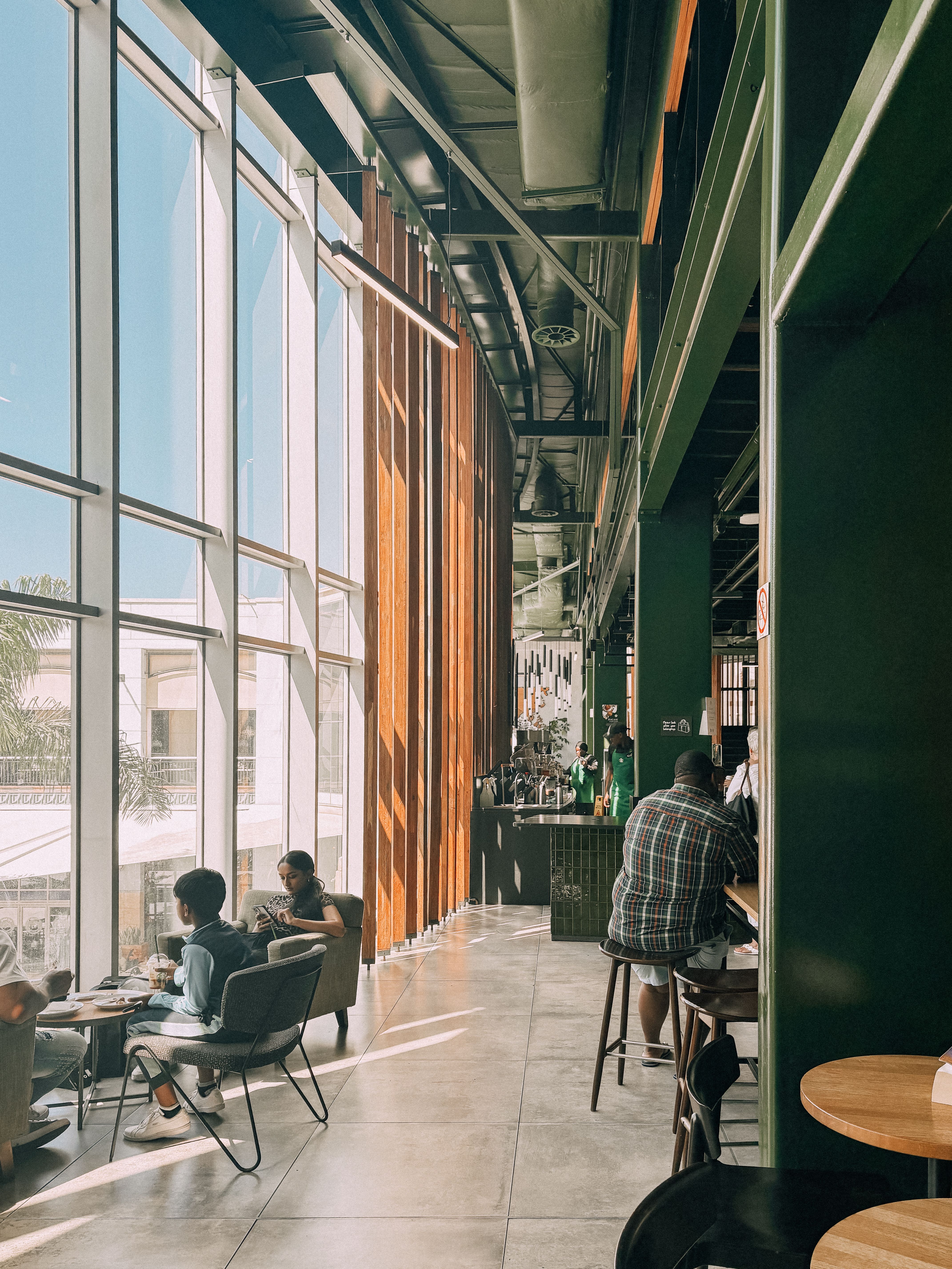 Modern Cafe Interior with Indoor Seating · Free Stock Photo