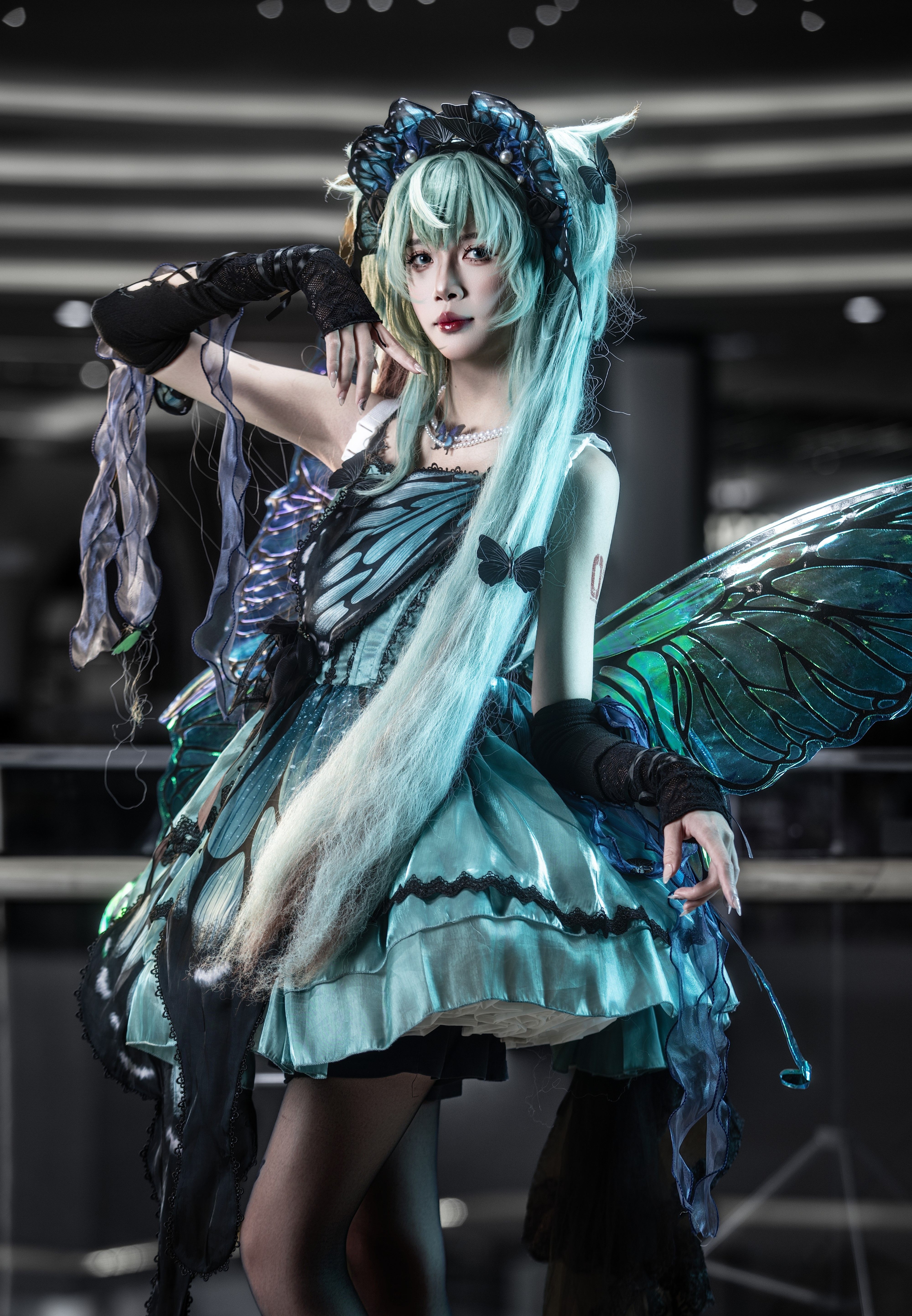 Majestic Fairy Cosplay with Wings and Blue Hair · Free Stock Photo
