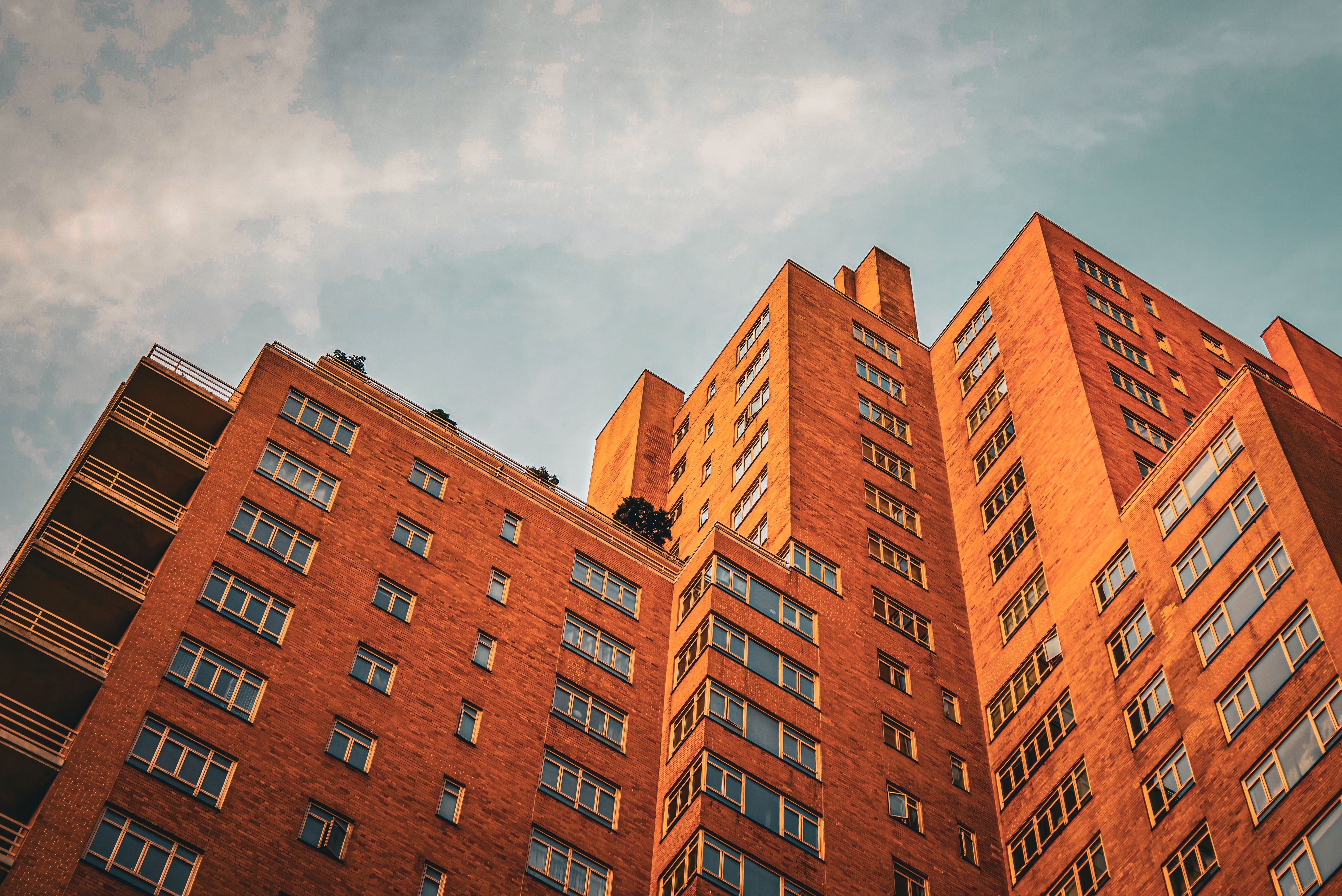 Tall Urban Buildings Against Blue Sky · Free Stock Photo