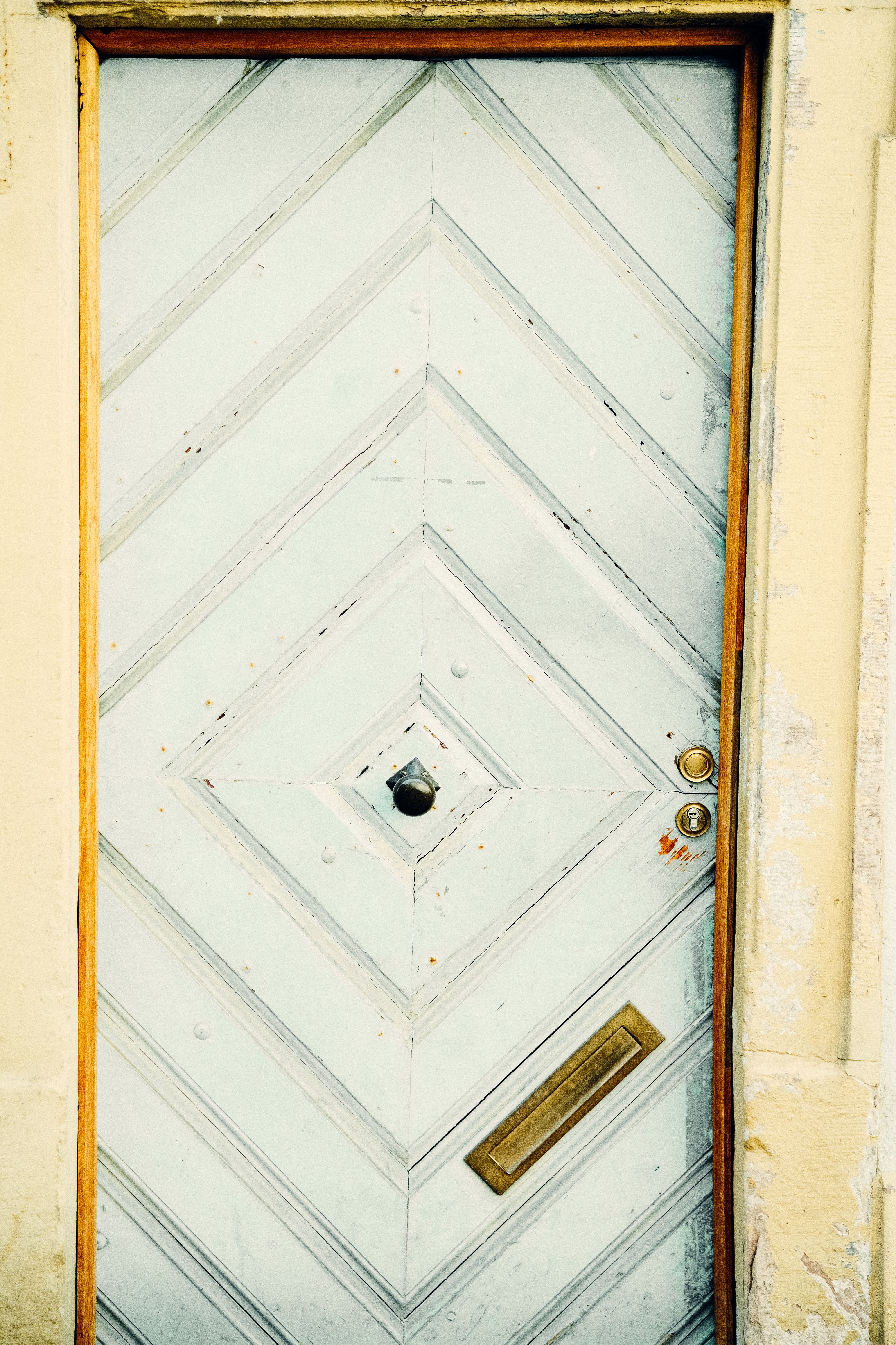 Vintage Wooden Door with Geometric Pattern · Free Stock Photo