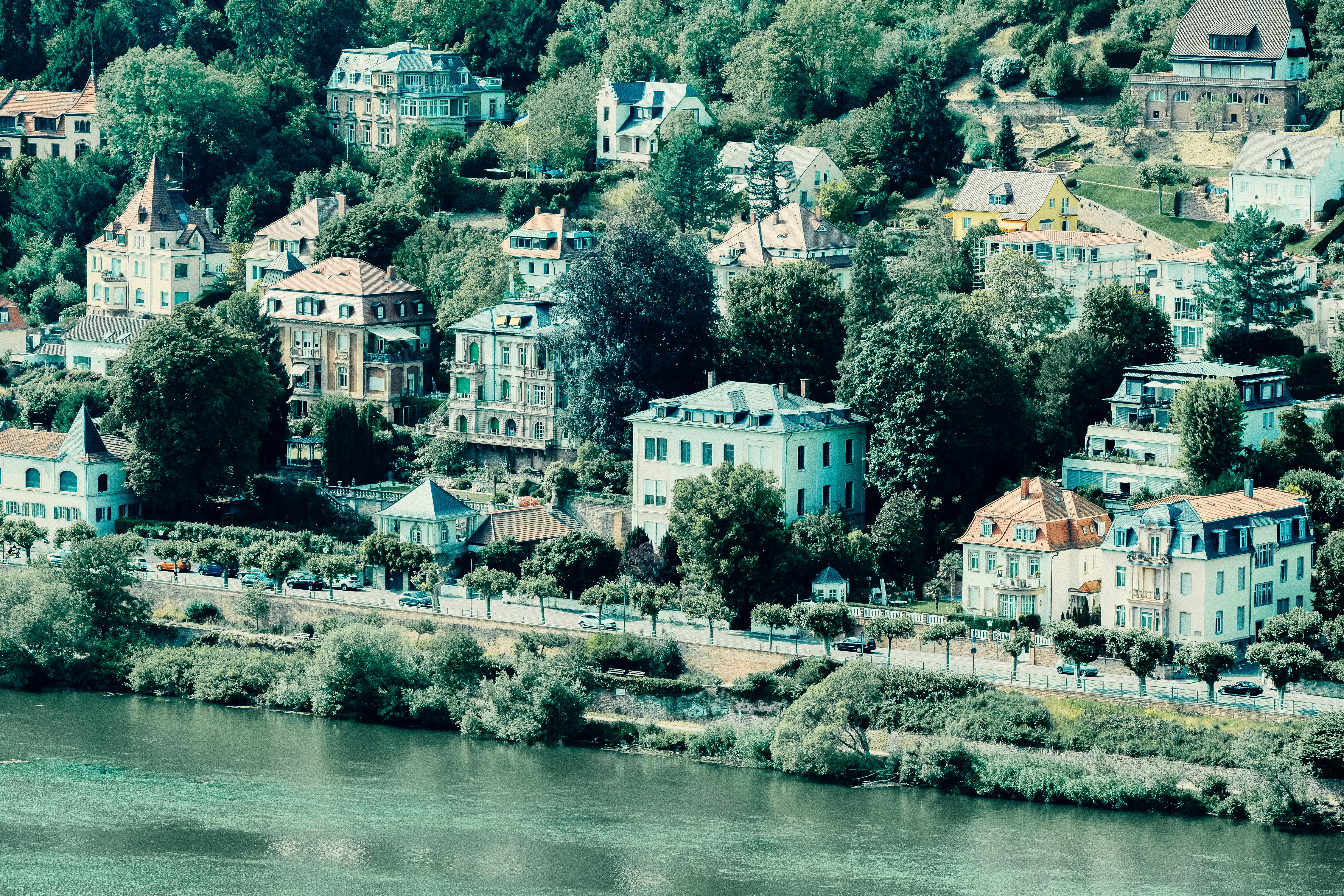 Charming European Riverside Residential Area Aerial View · Free Stock Photo