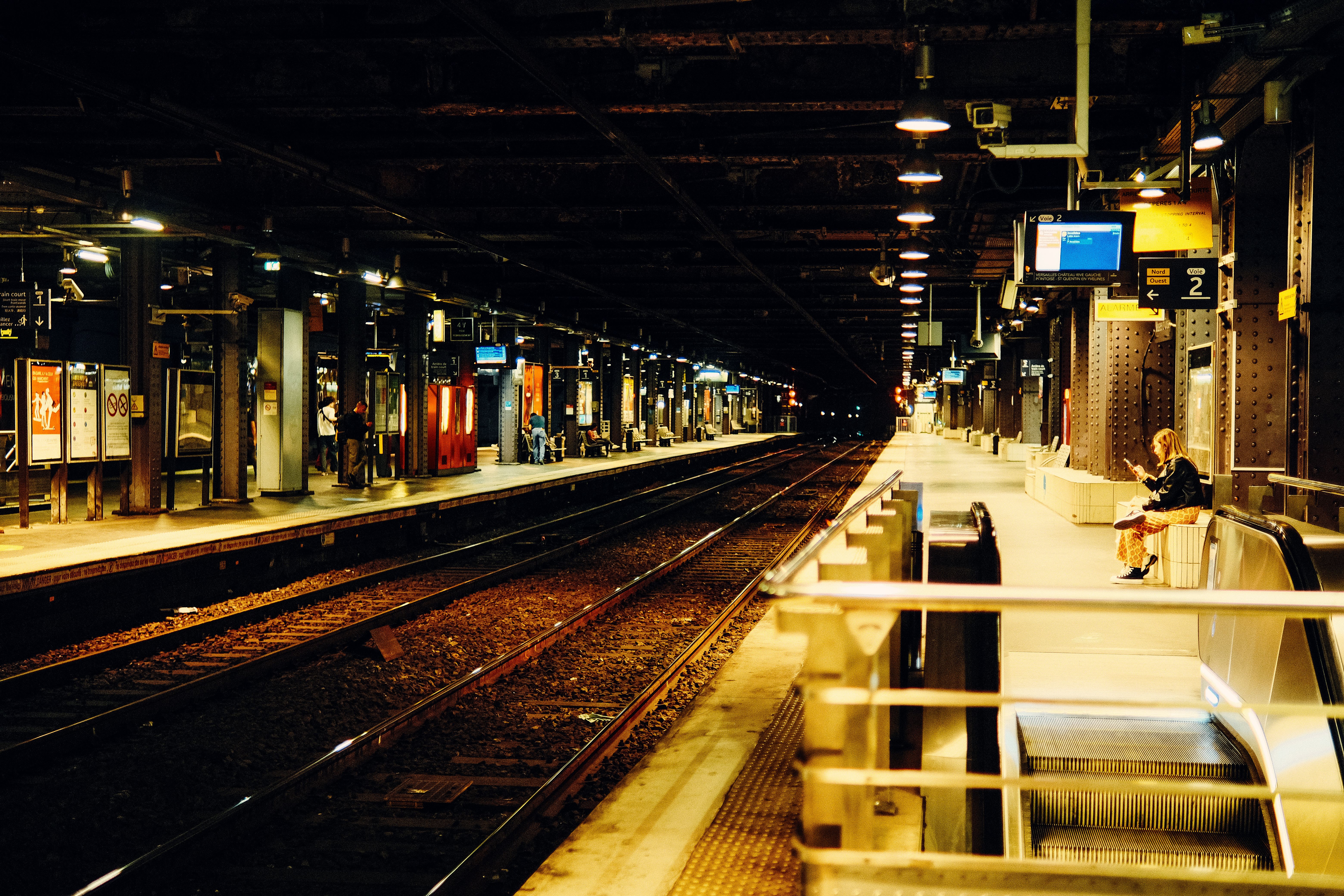 Atmospheric Paris Train Station Lighting at Night · Free Stock Photo