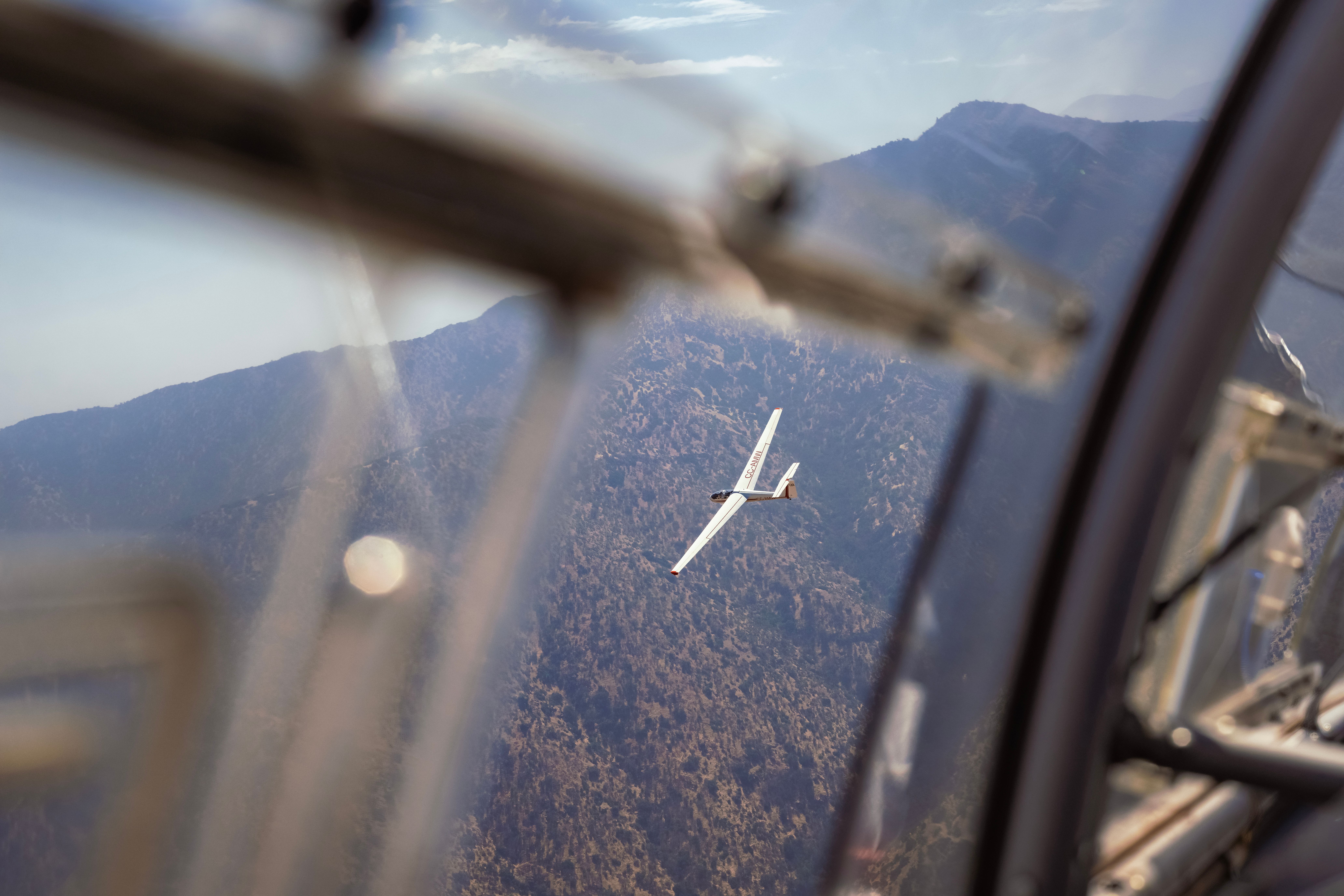 Glider Soaring Over Andes Mountains in Chile · Free Stock Photo