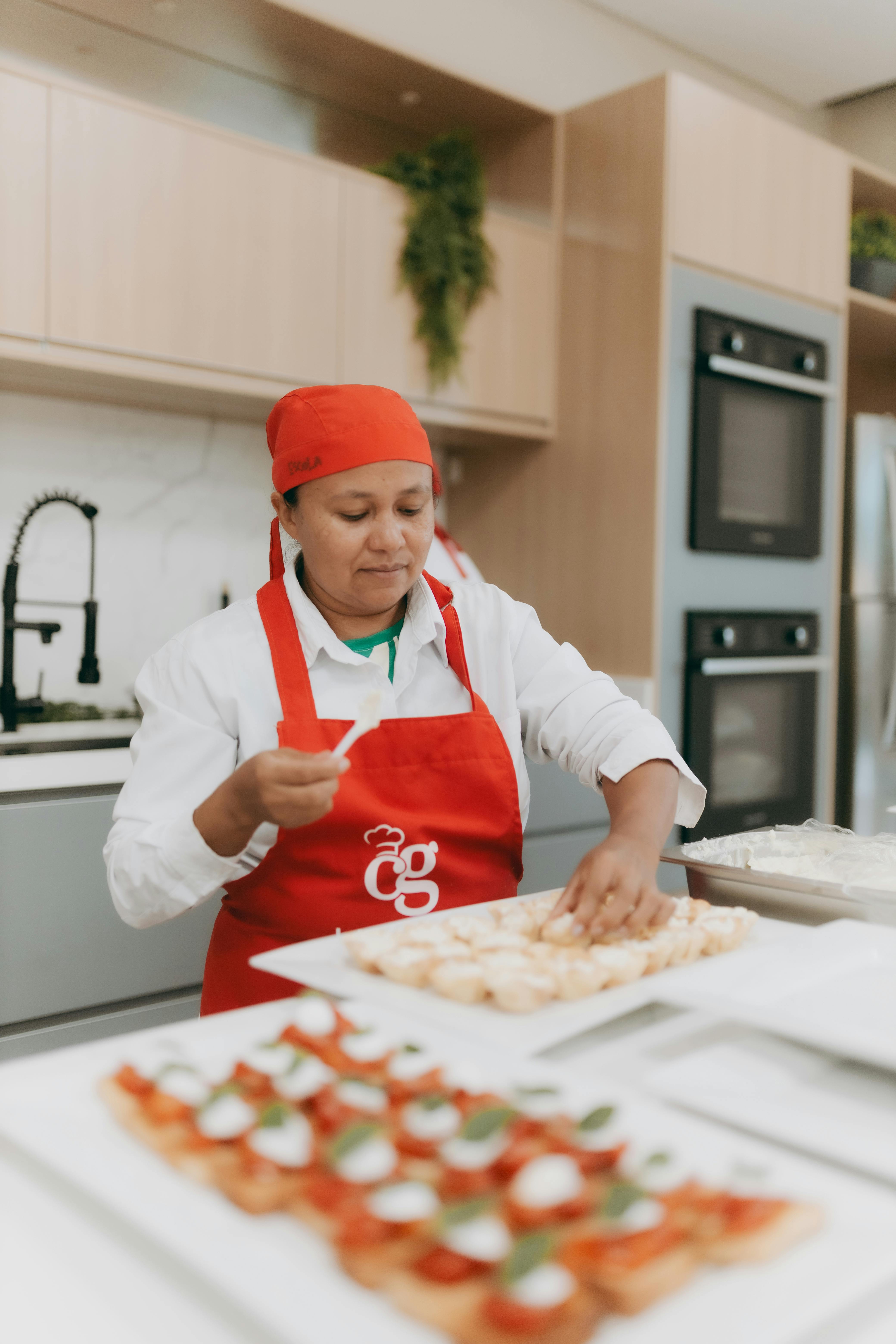 Professional Chef Preparing Exquisite Canapés · Free Stock Photo