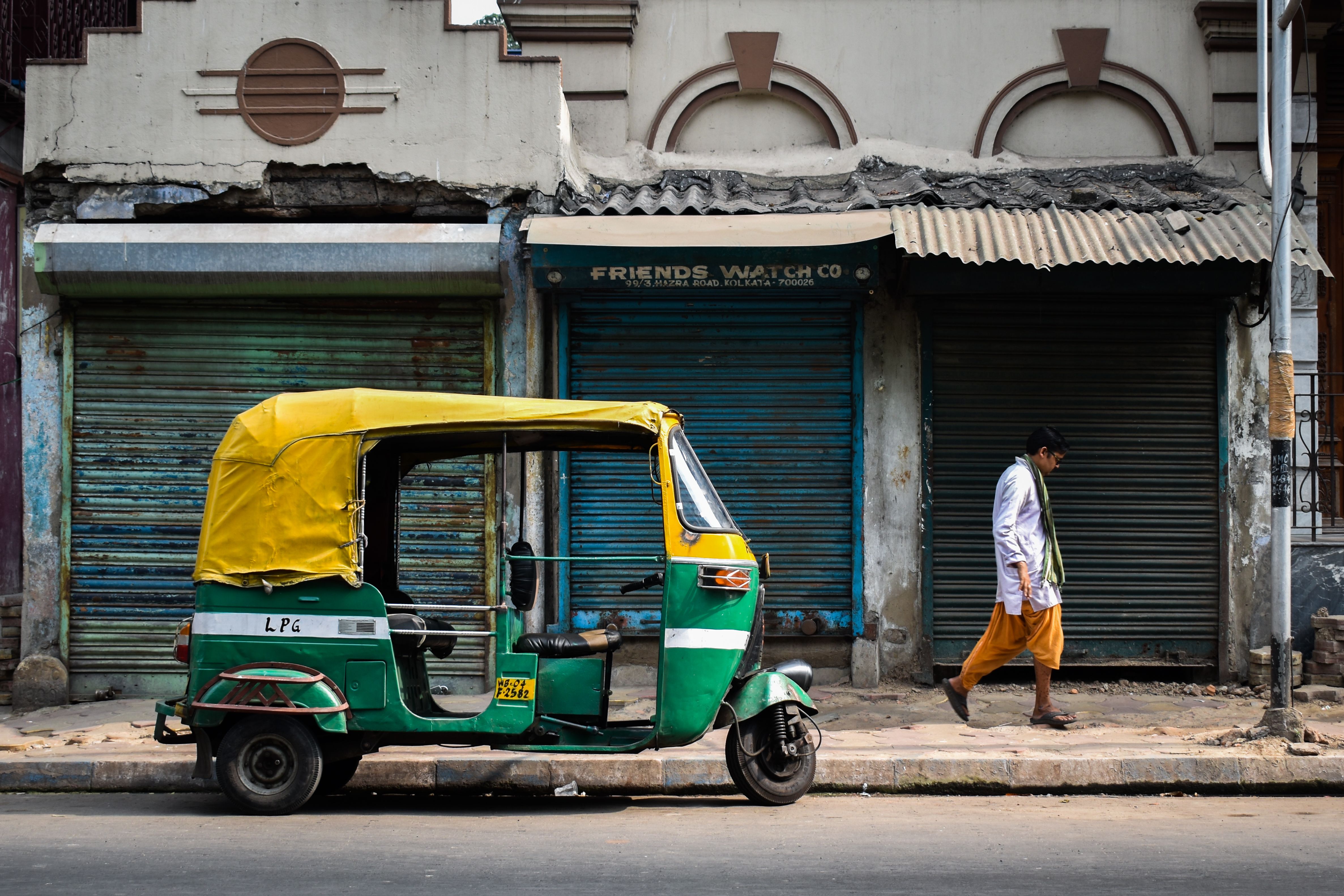 Street Scene in Kolkata with Auto Rickshaw · Free Stock Photo