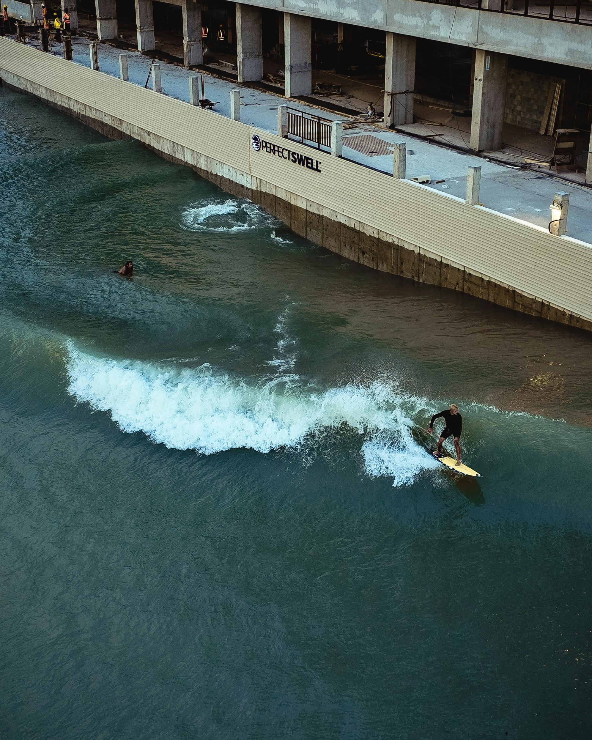 Aerial View of Surfer Riding Artificial Wave · Free Stock Photo