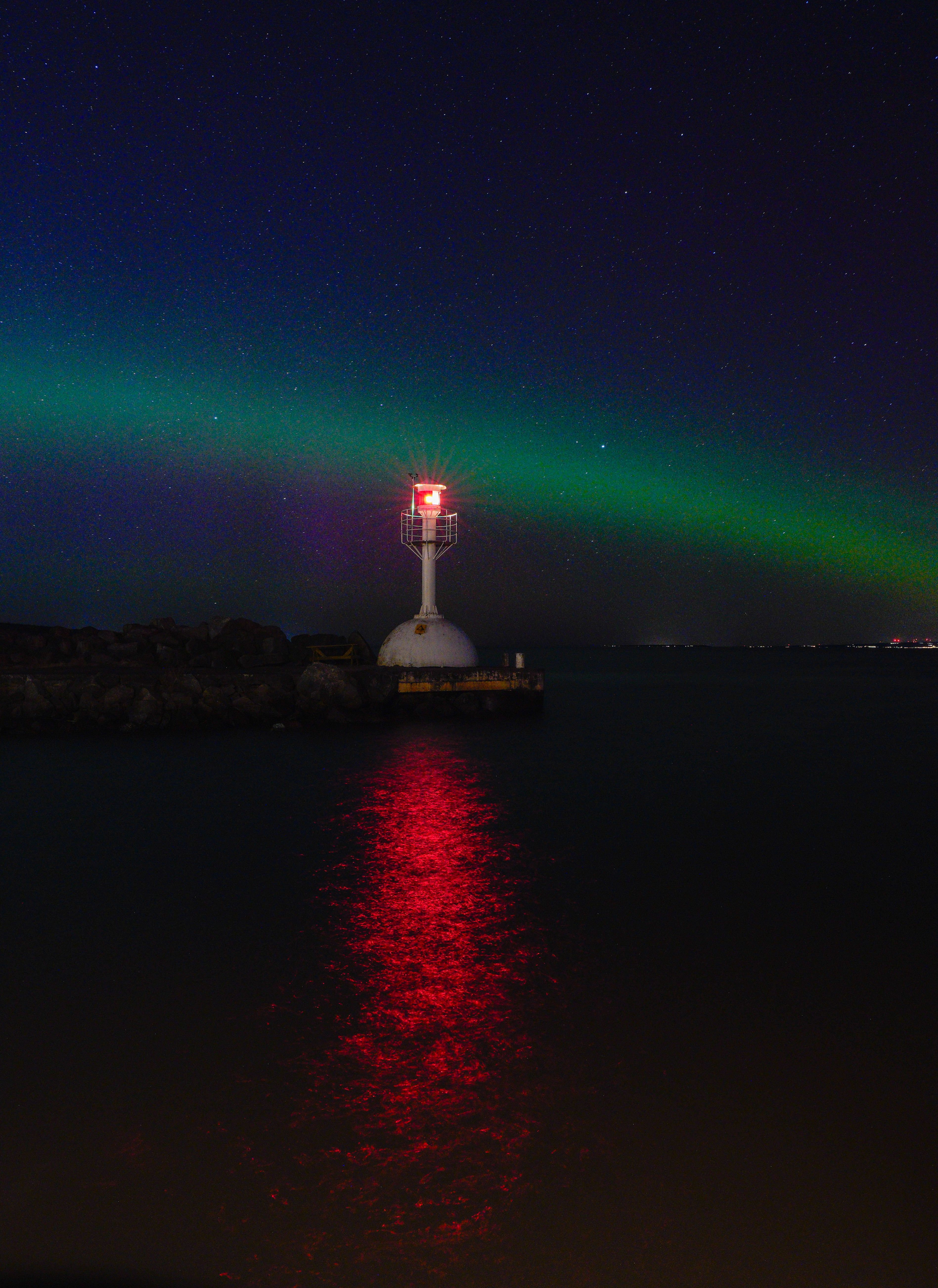 Lighthouse Under Vibrant Aurora Borealis · Free Stock Photo