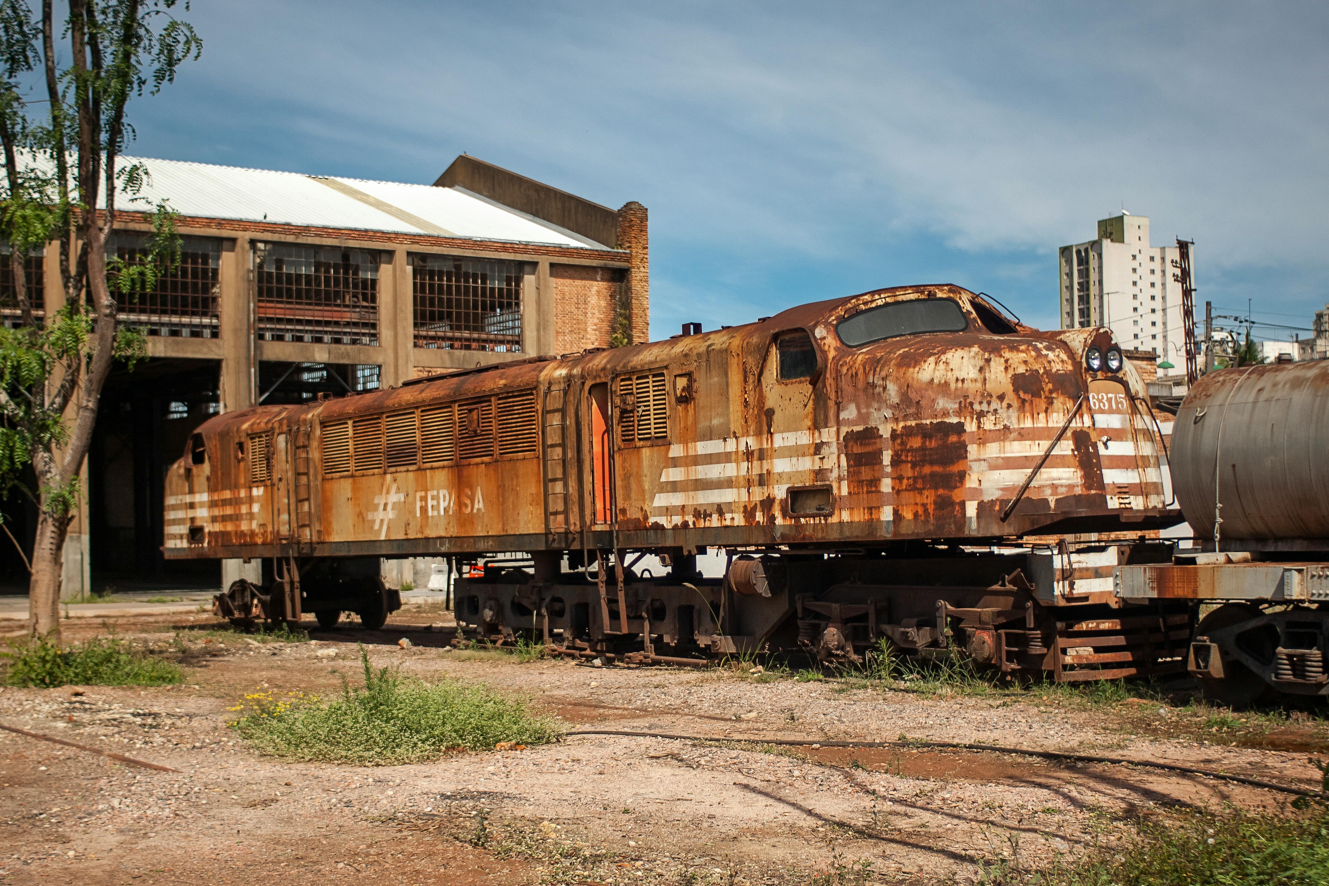 Rusty Abandoned Train at Old Warehouse, Brasil · Free Stock Photo