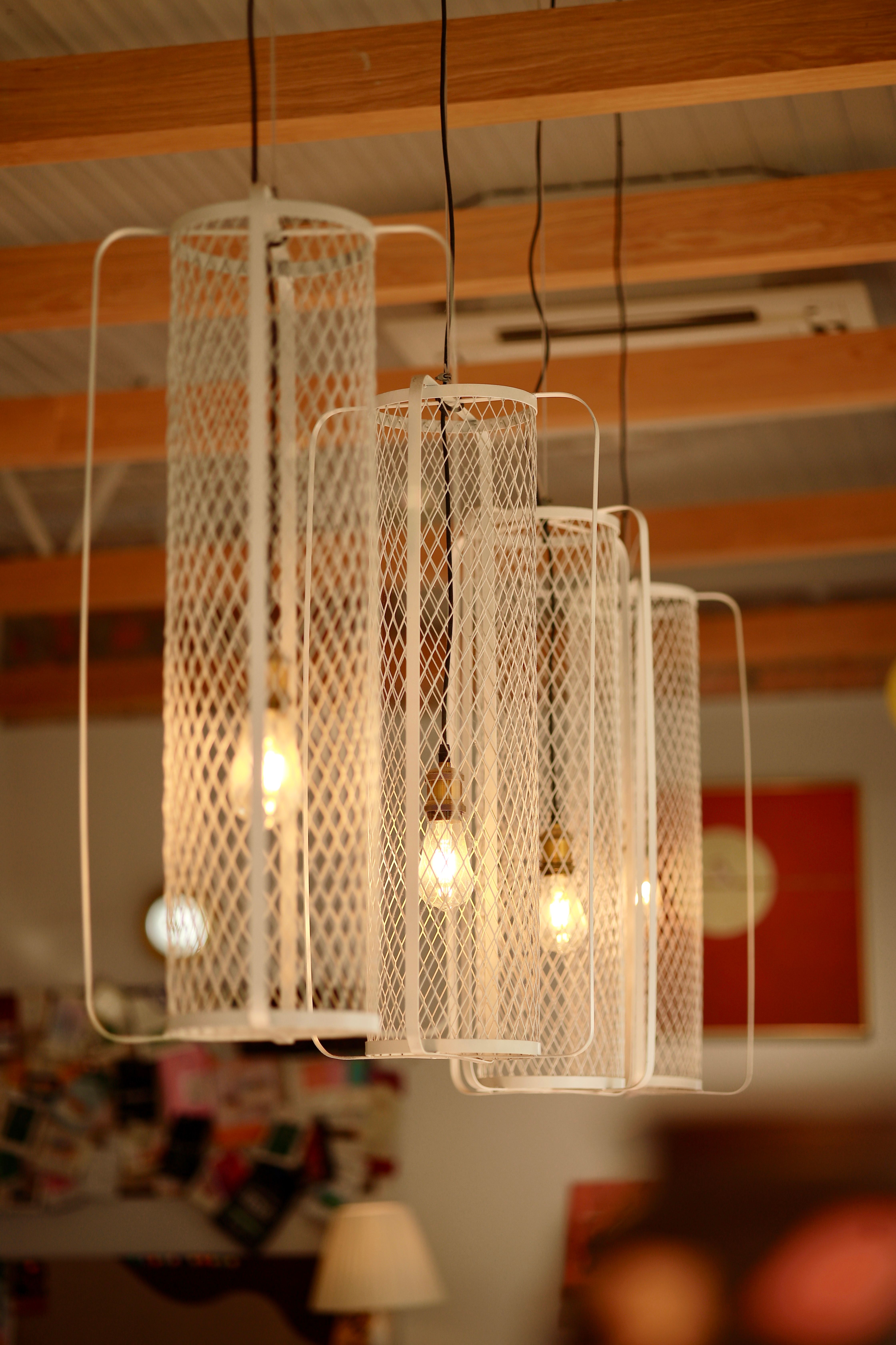 Modern Industrial Hanging Wireframe Pendant Lights · Free Stock Photo