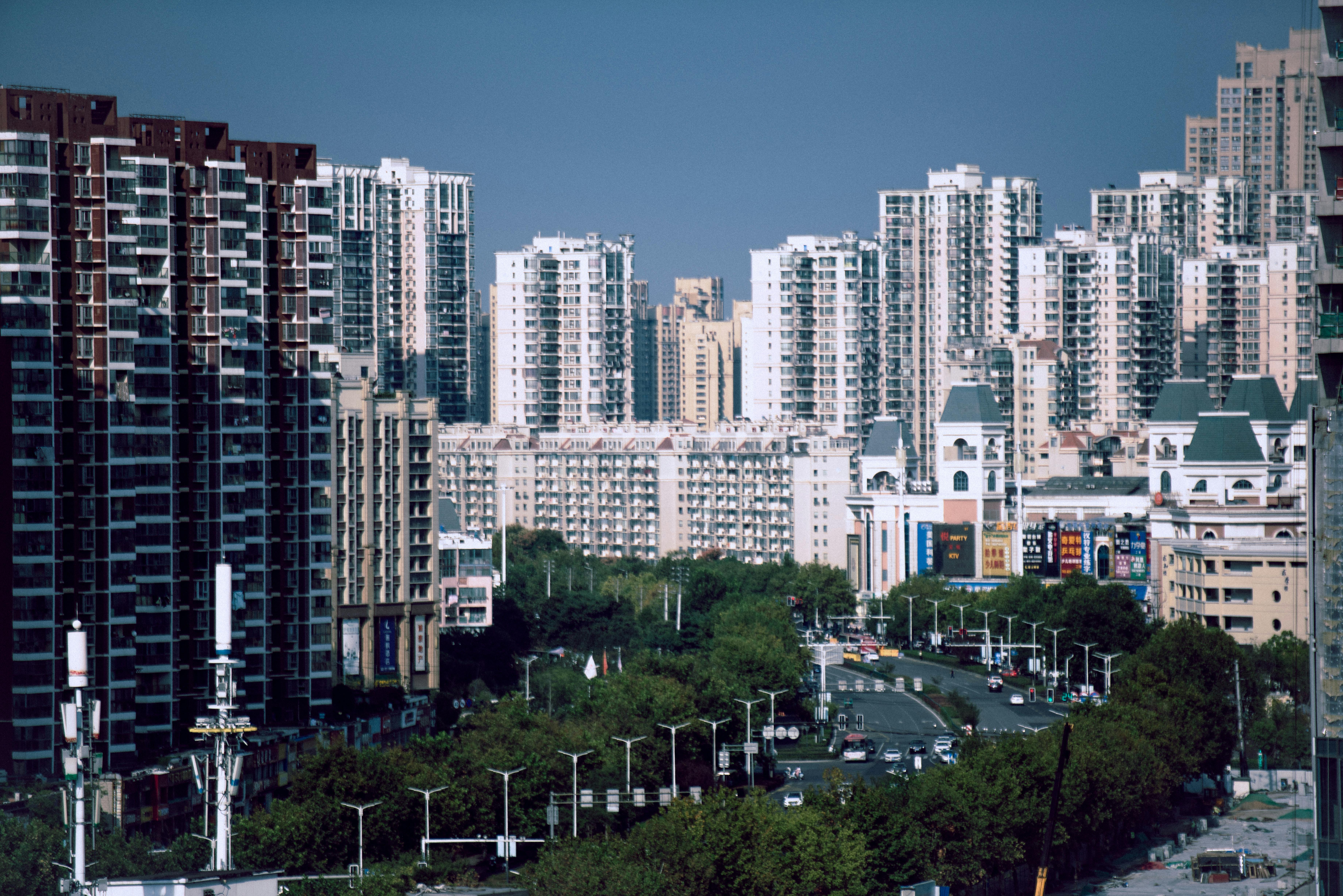 High-Rise Apartment Buildings in Bustling Cityscape · Free Stock Photo