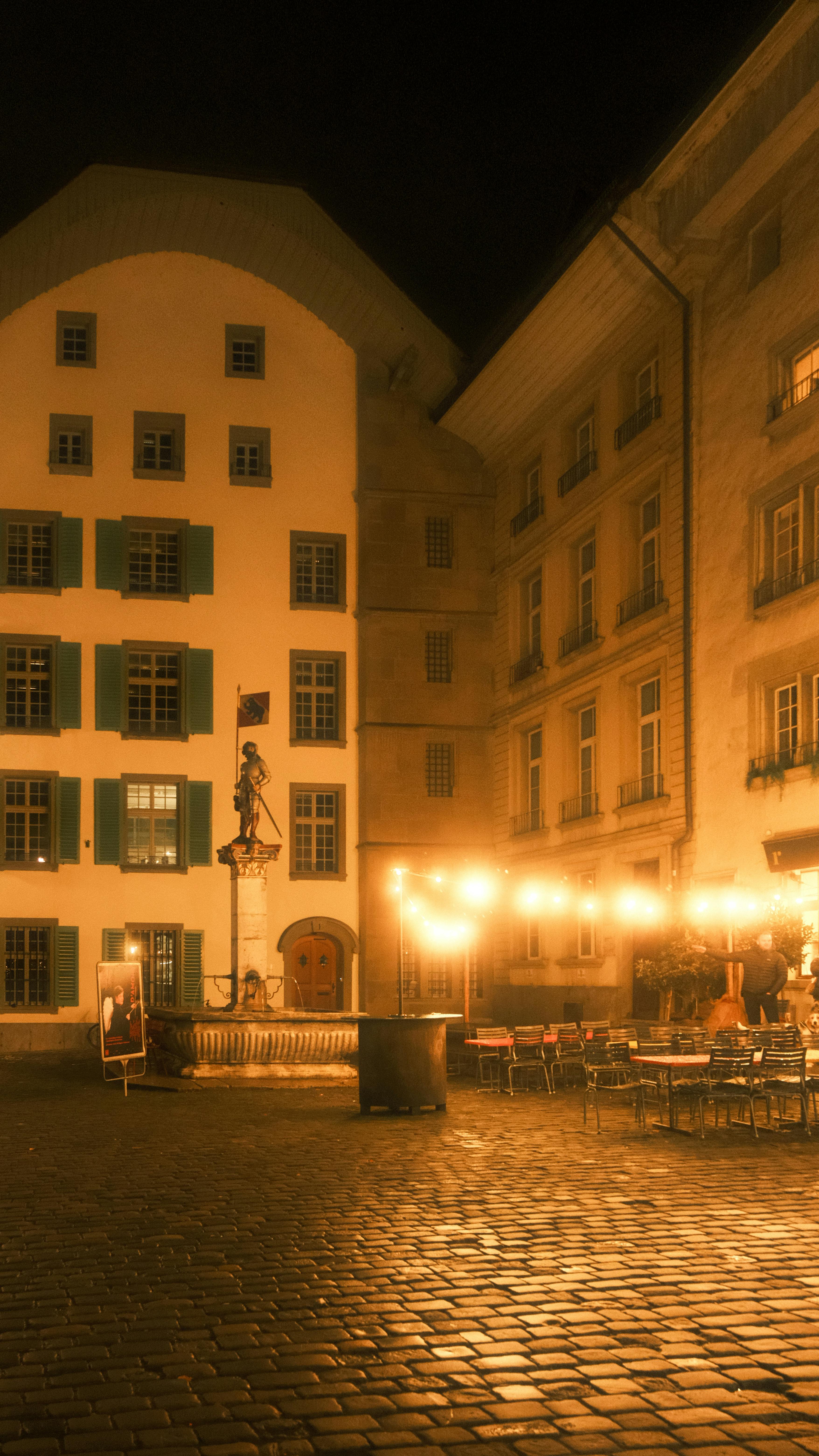 Charming European Courtyard at Night · Free Stock Photo