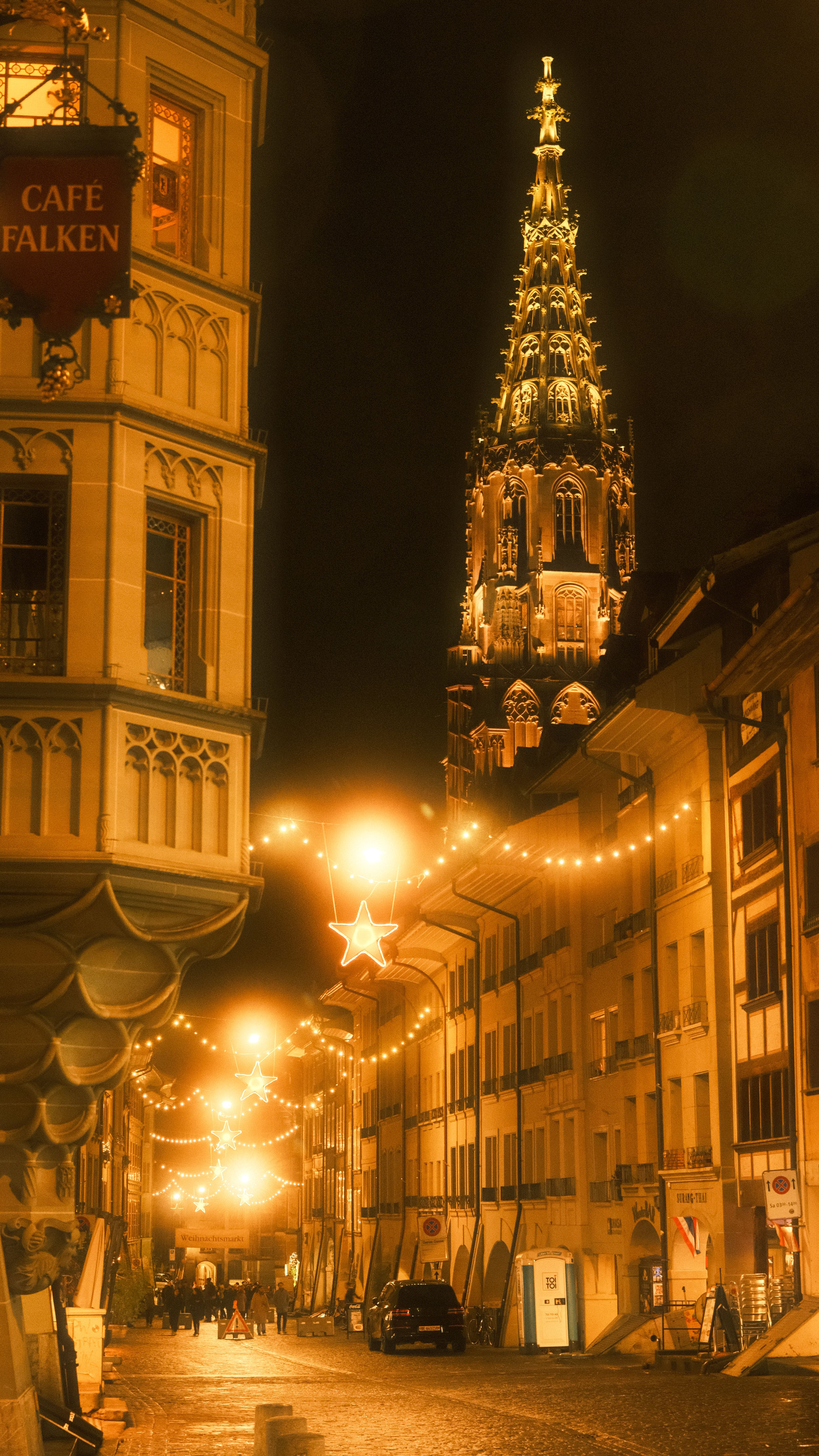 Nighttime View of Illuminated Cathedral in Bern · Free Stock Photo