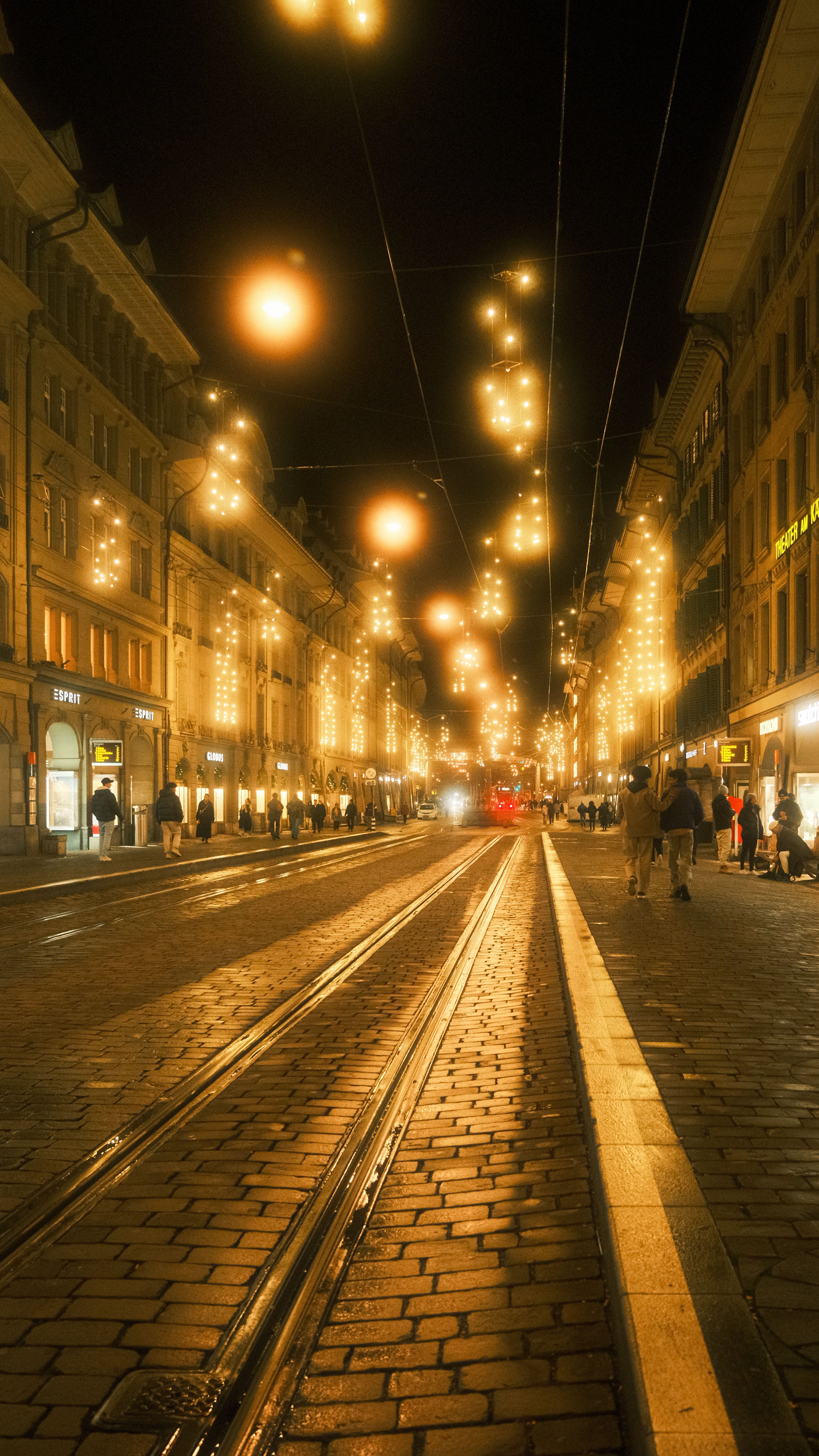 Enchanting European Street with Festive Lights · Free Stock Photo