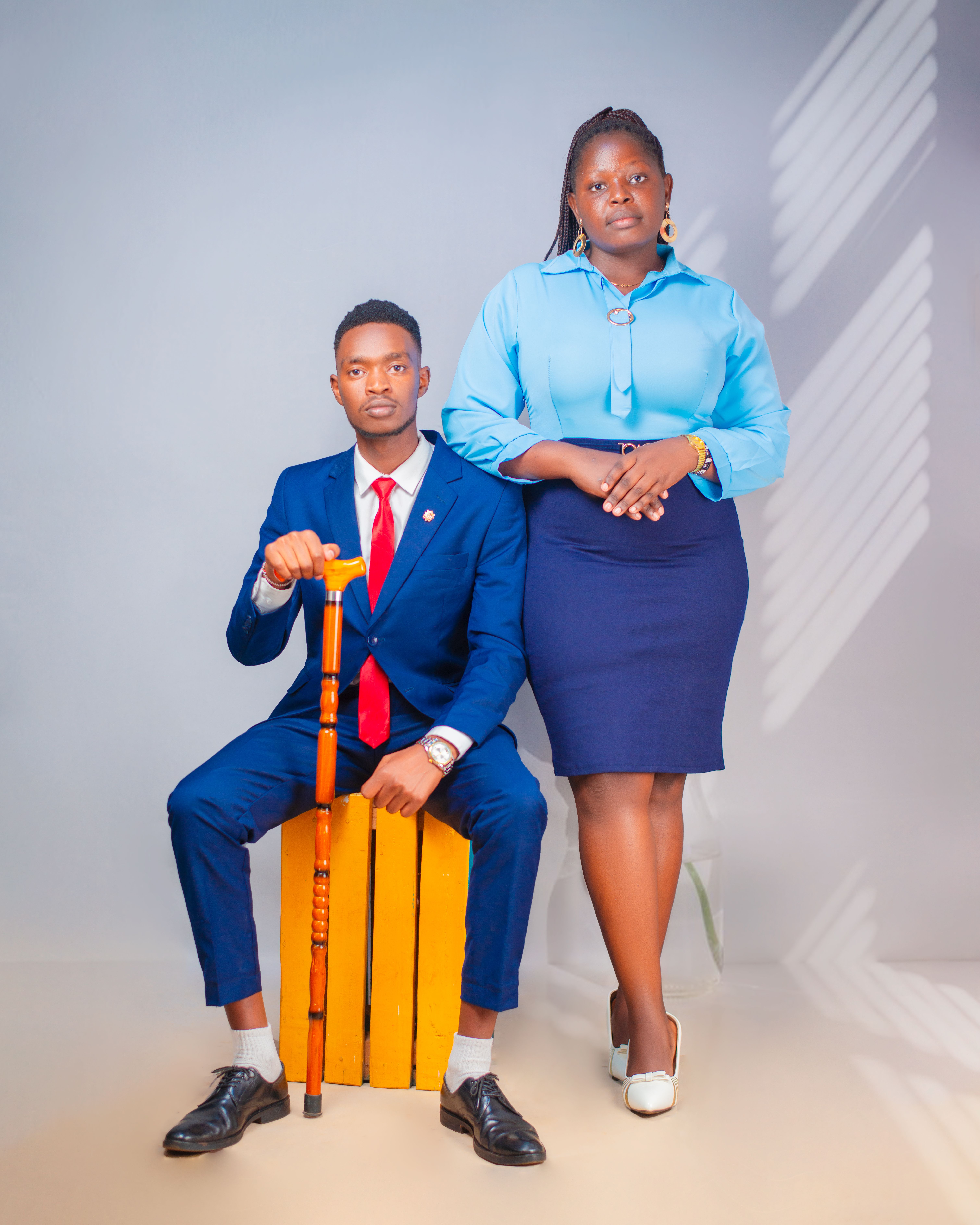 Professional Portrait of Two Adults in Formal Attire · Free Stock Photo