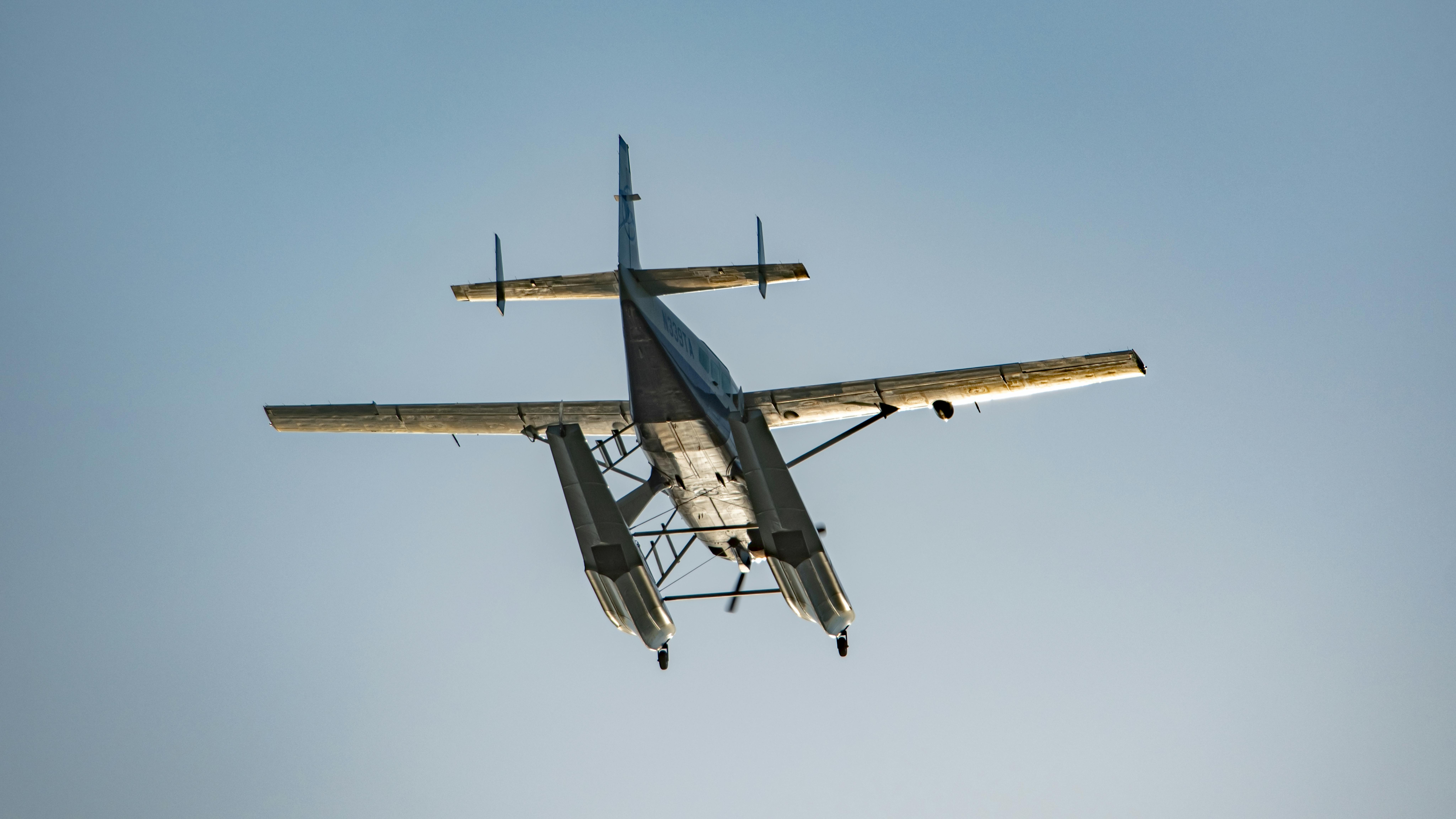 Small Aircraft in Flight Against Clear Sky · Free Stock Photo