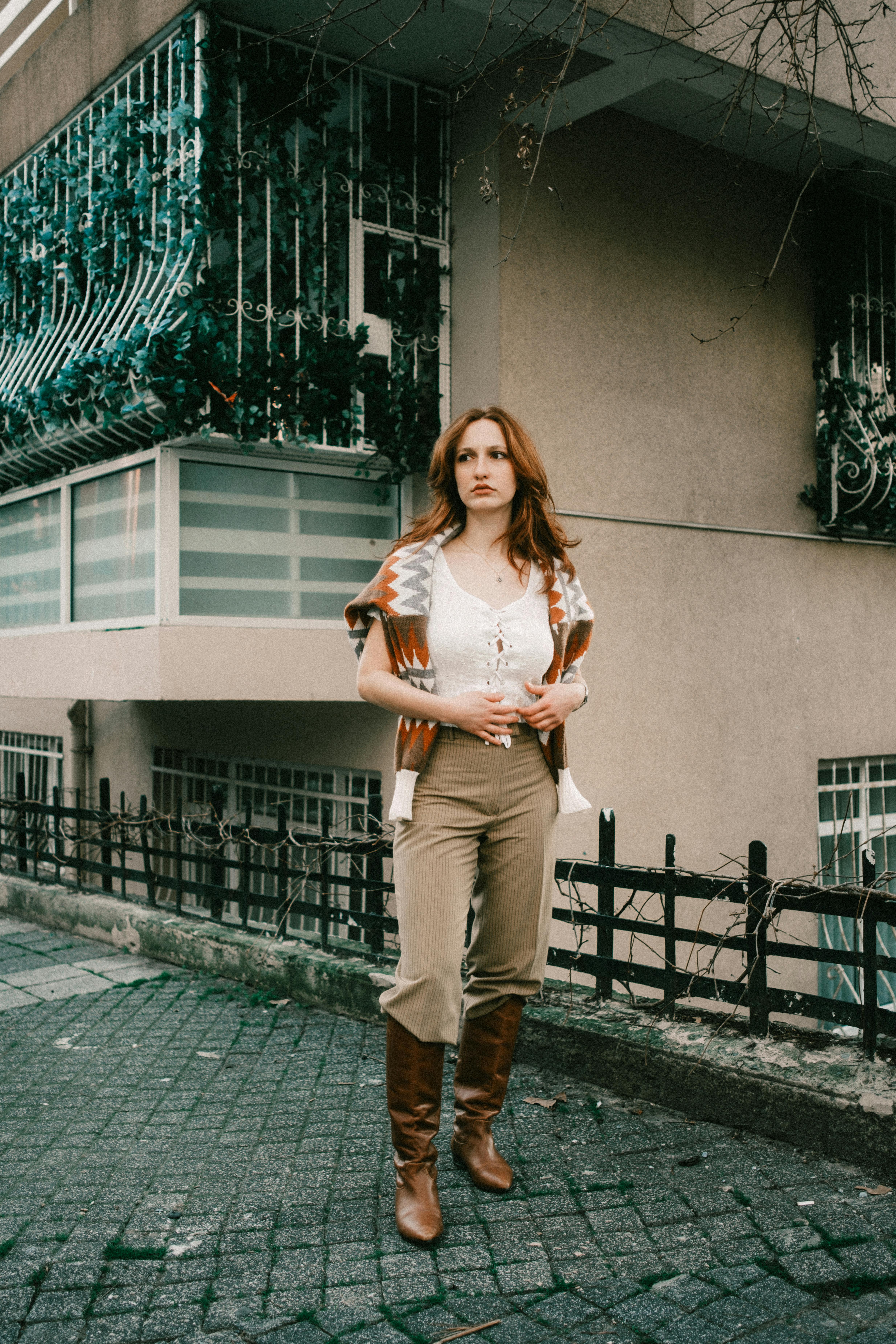 Woman in stylish outfit outside urban building · Free Stock Photo