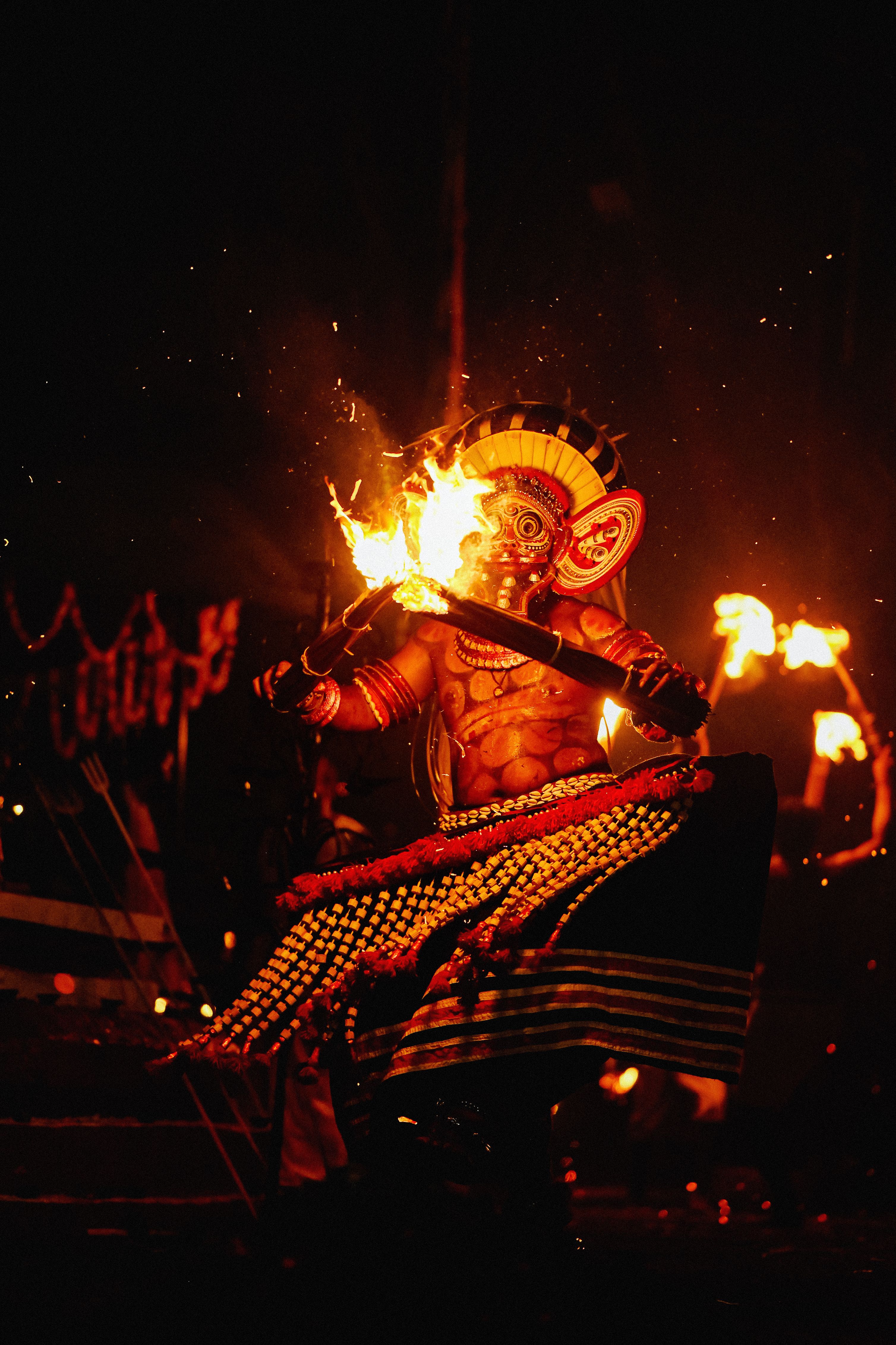 Traditional Fire Dance Performance at Night · Free Stock Photo