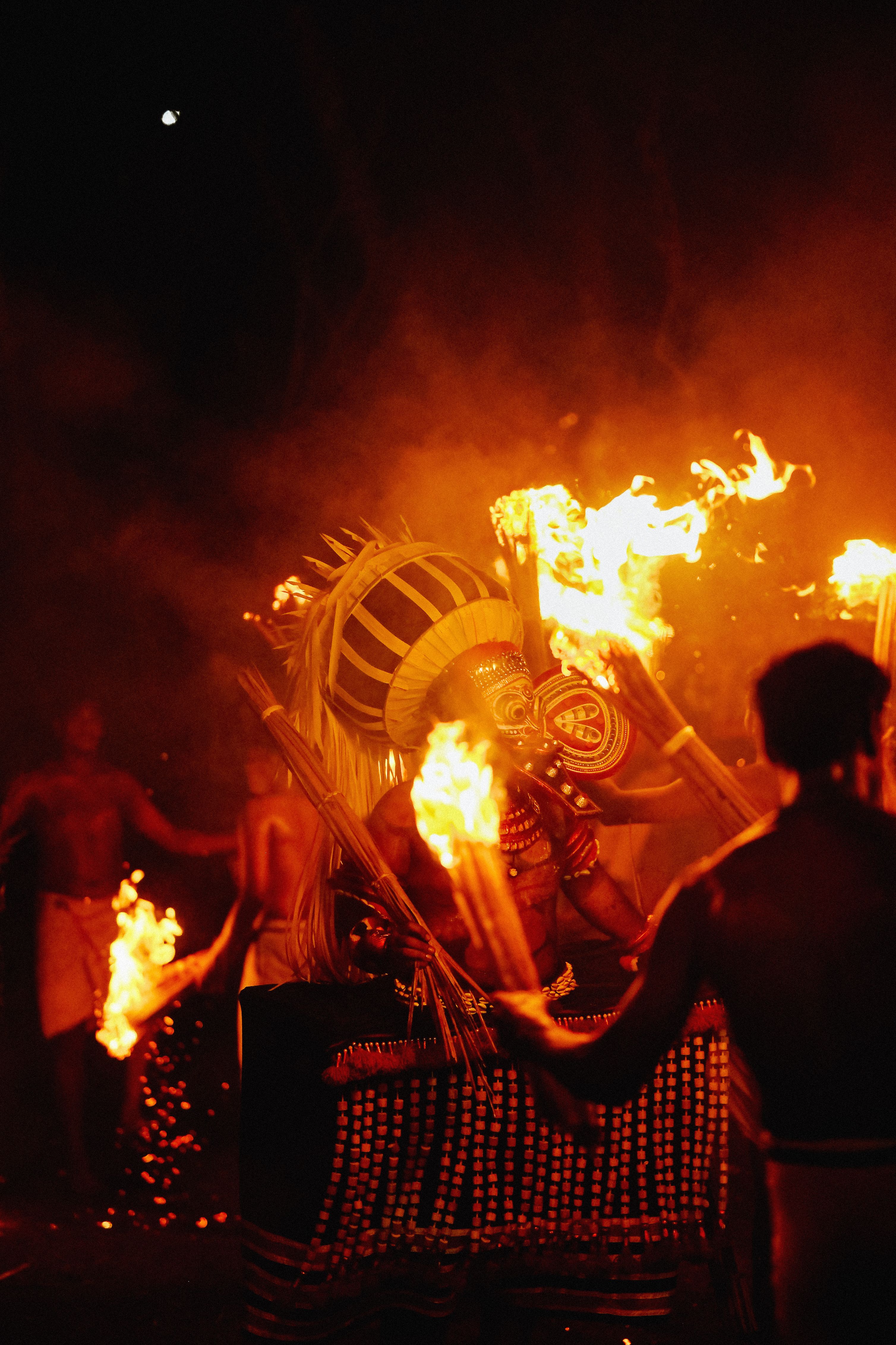 Traditional Fire Dance with Vibrant Flames · Free Stock Photo