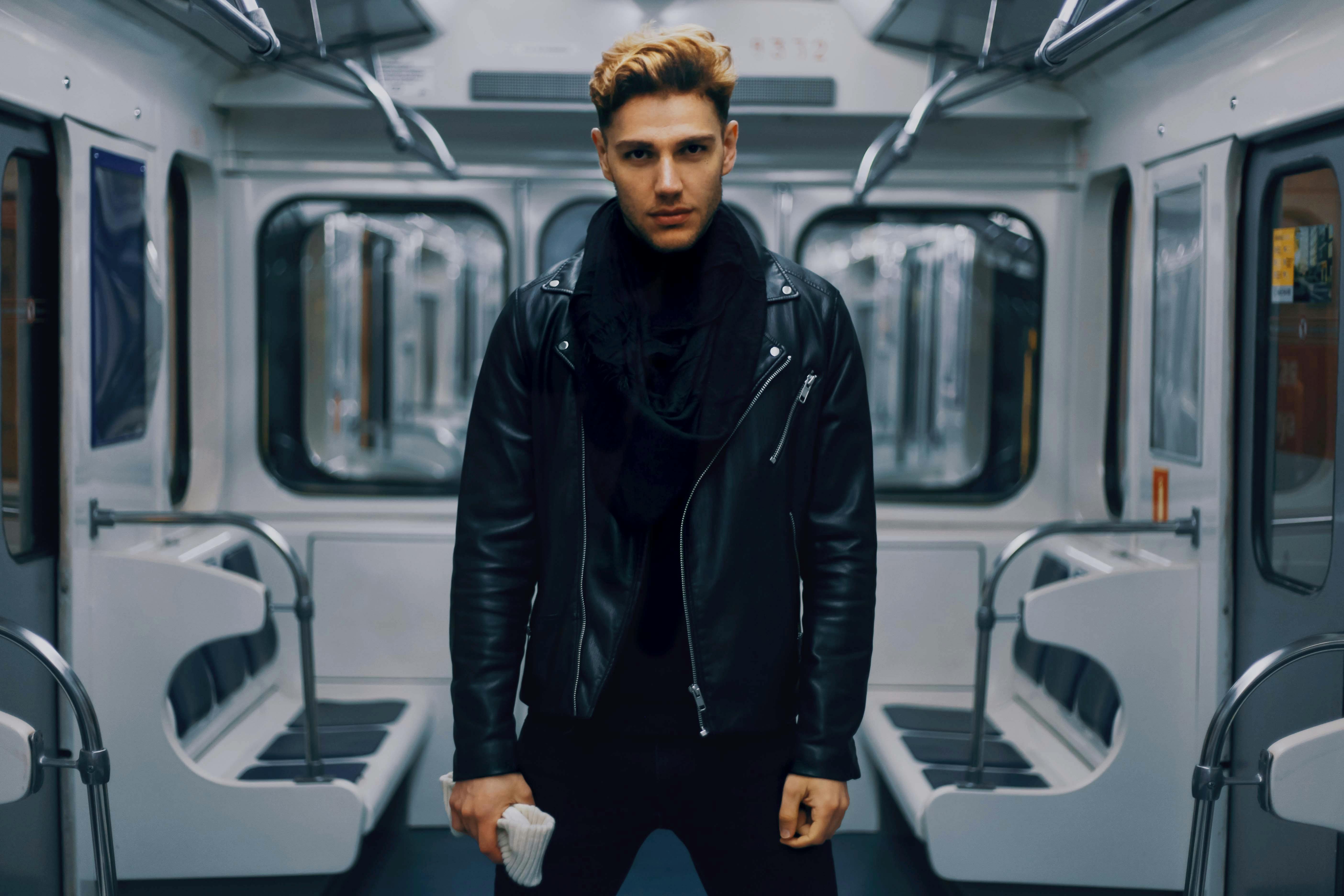 Man Standing Inside Train · Free Stock Photo