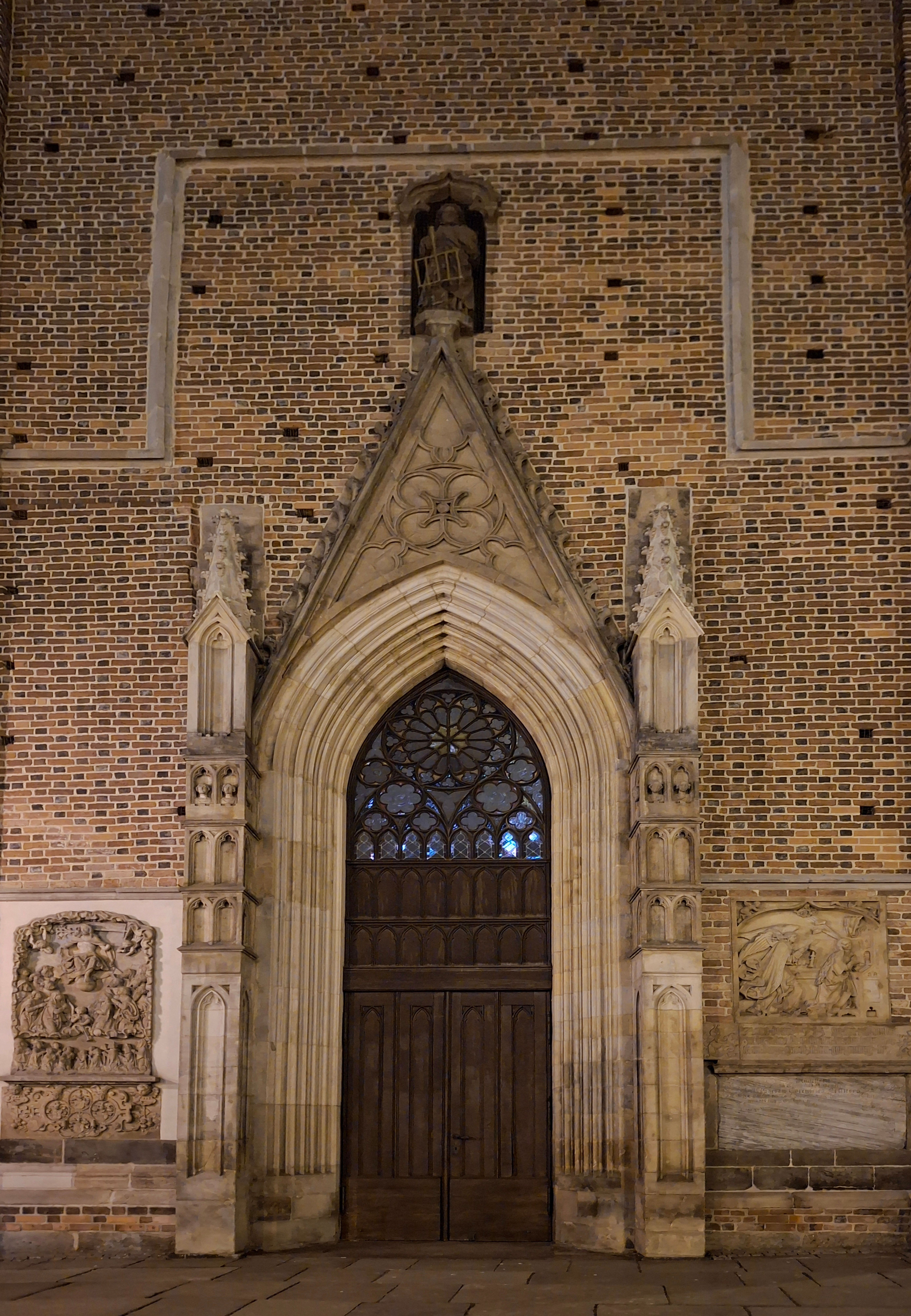Gothic Church Entrance with Brick Facade · Free Stock Photo