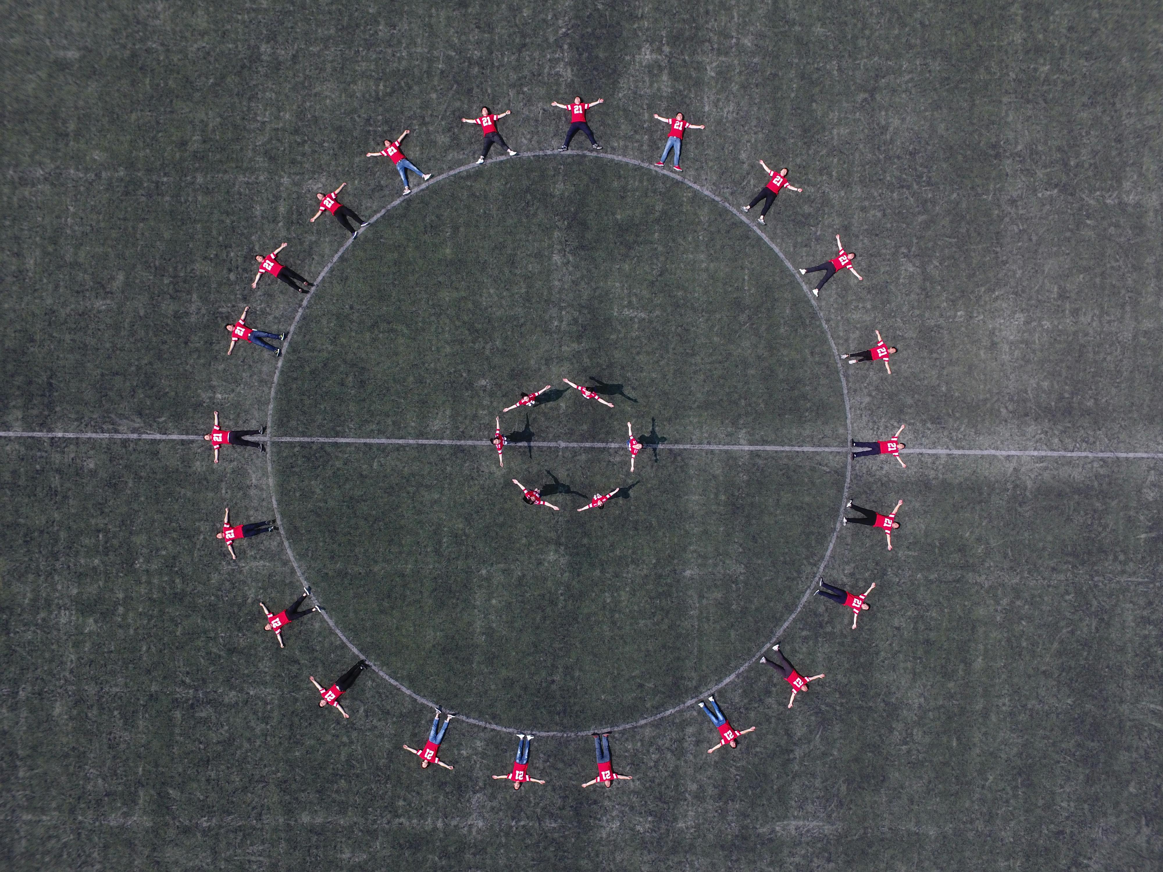 Aerial View of People Forming Concentric Circles on Field · Free Stock ...