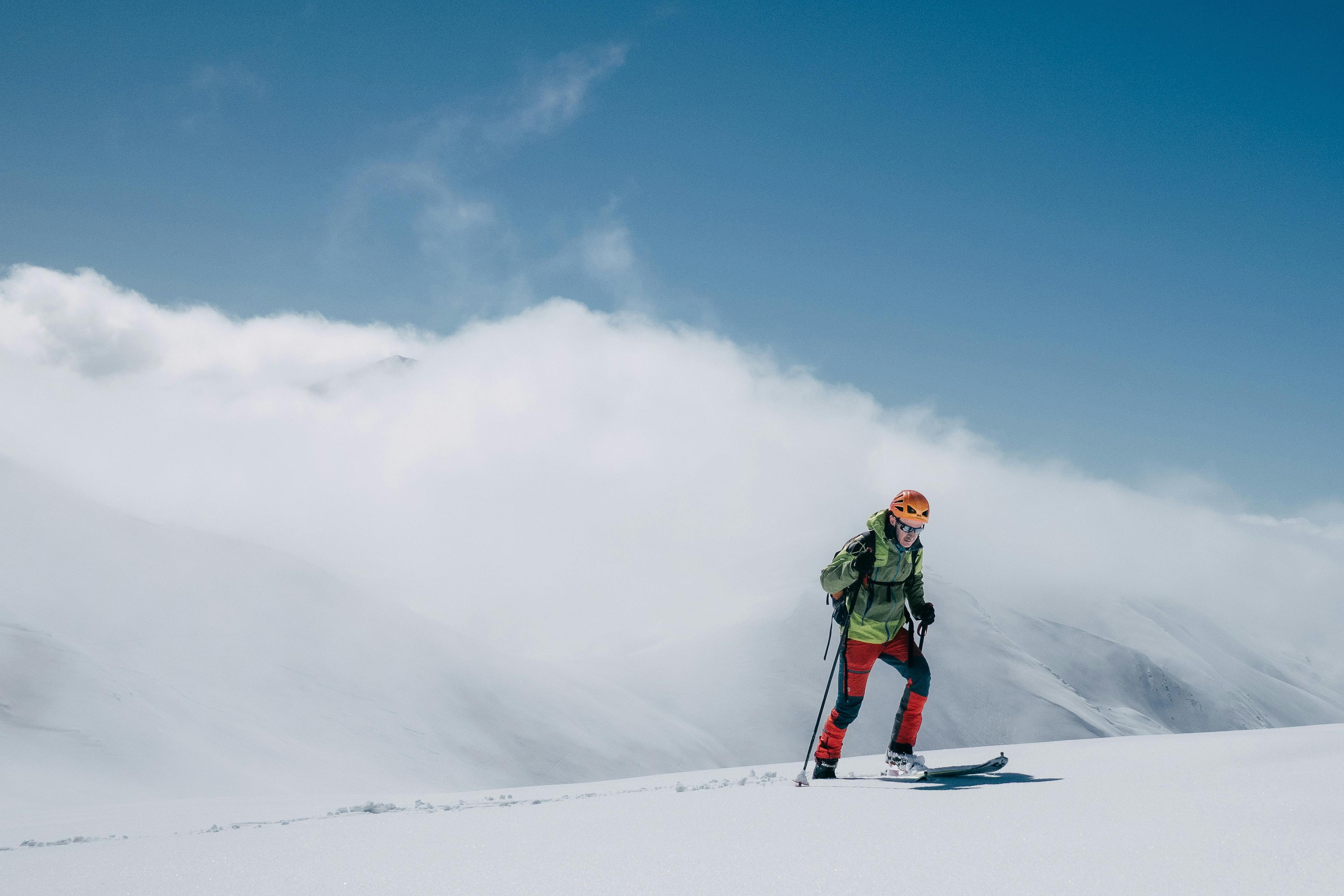 Alpine Ski Mountaineer Against Snowy Backdrop · Free Stock Photo