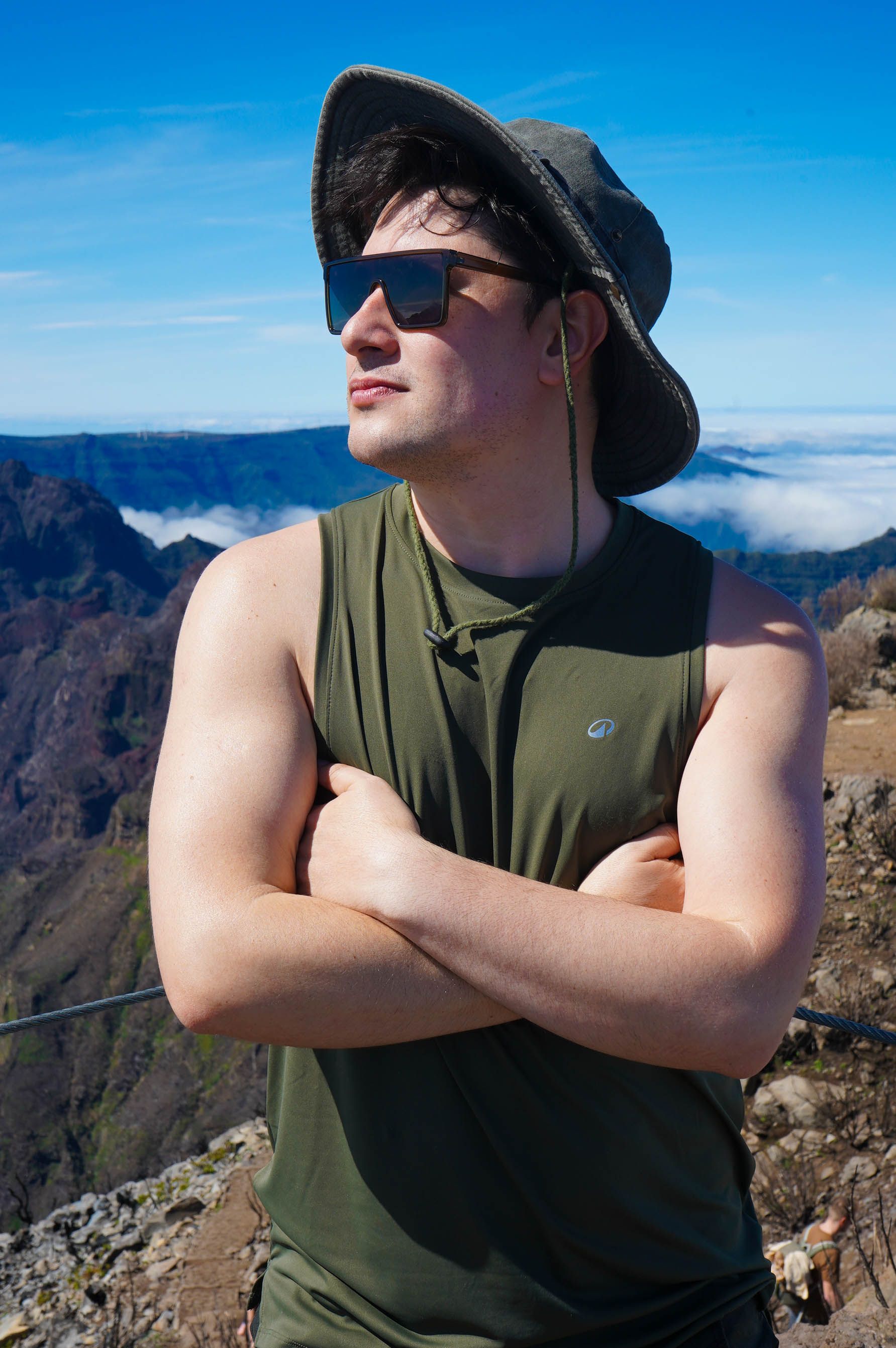 Young Man Enjoying Mountain View Adventure · Free Stock Photo