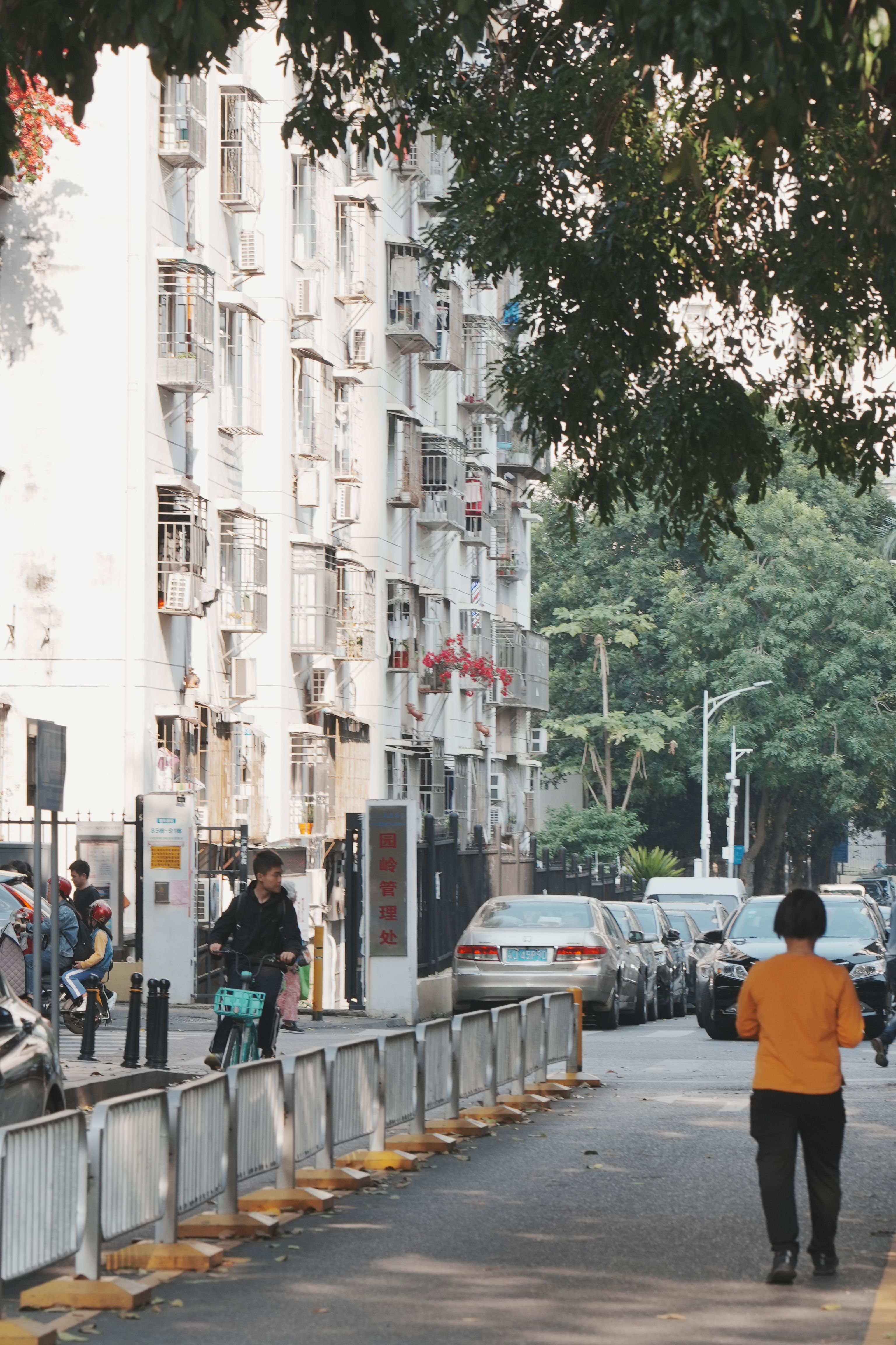 Urban Street Scene with Pedestrians and Residential Buildings · Free ...