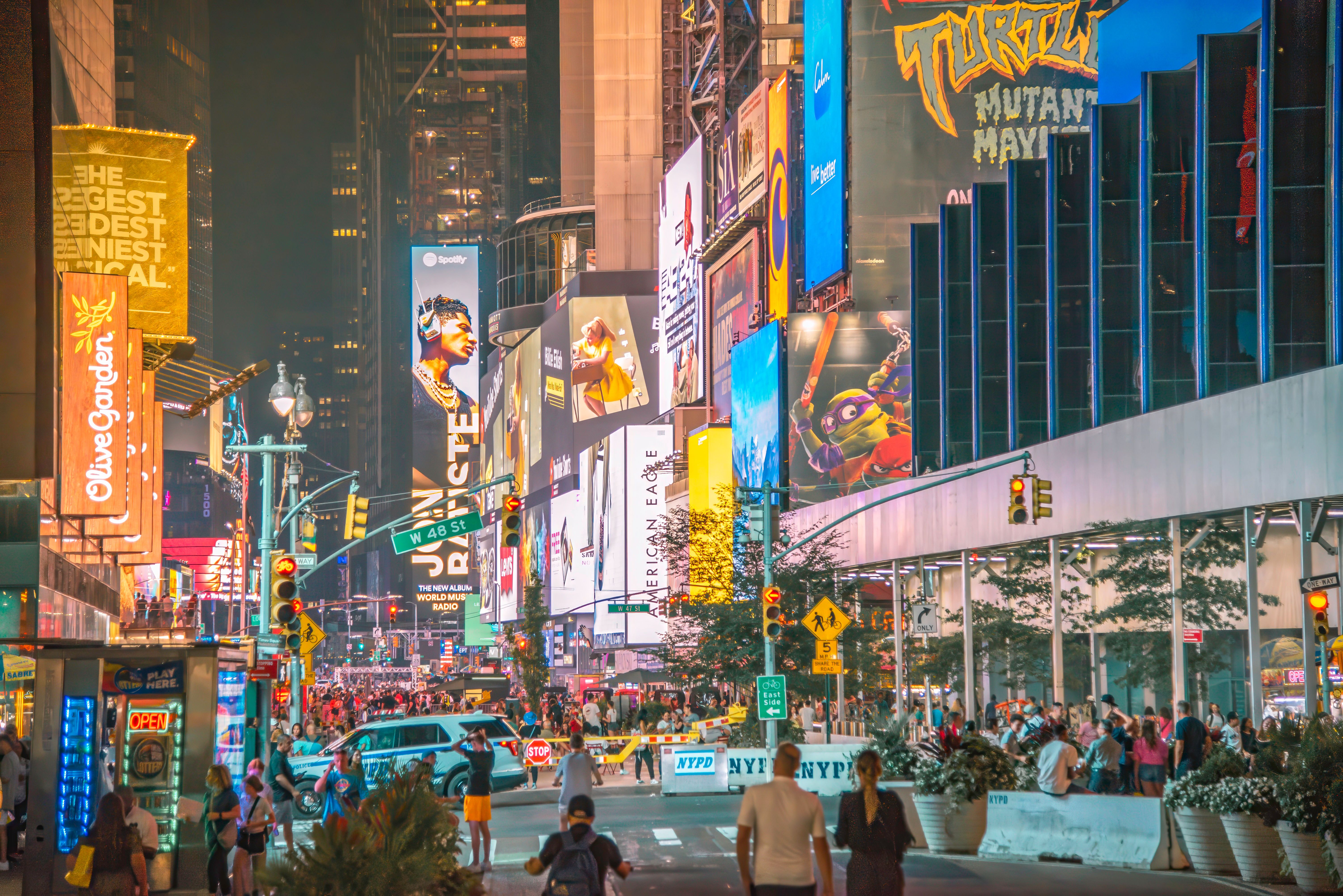 Bustling Times Square Night Scene with Neon Lights · Free Stock Photo