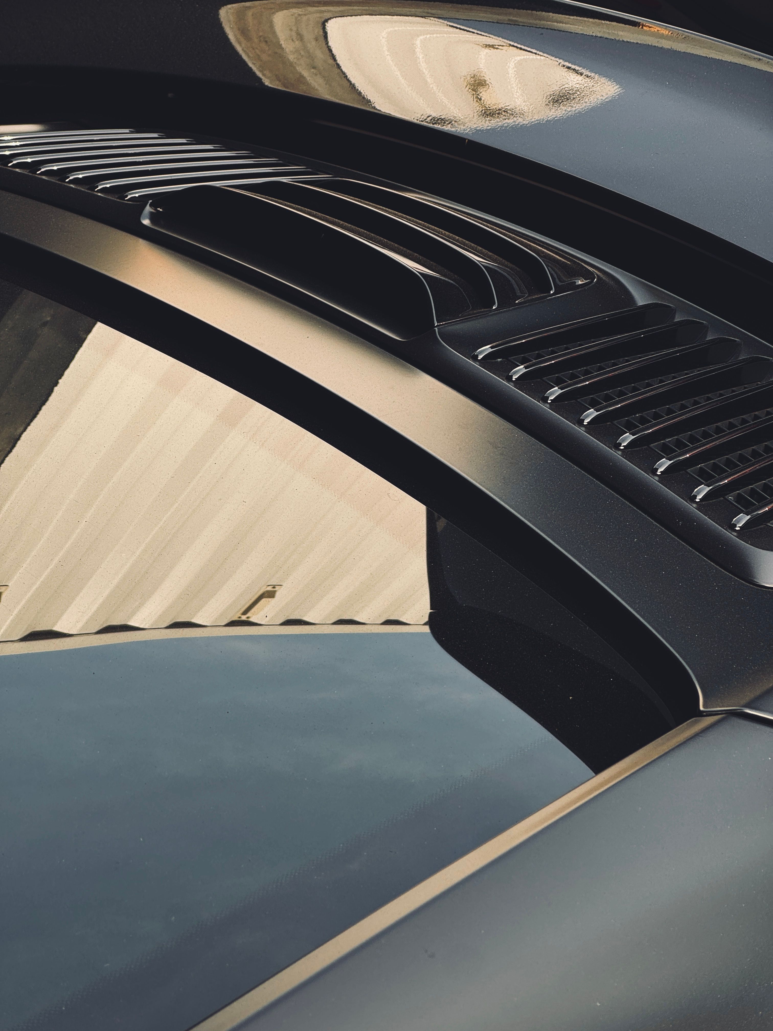 Close-up of Modern Car Roof Design with Vents · Free Stock Photo