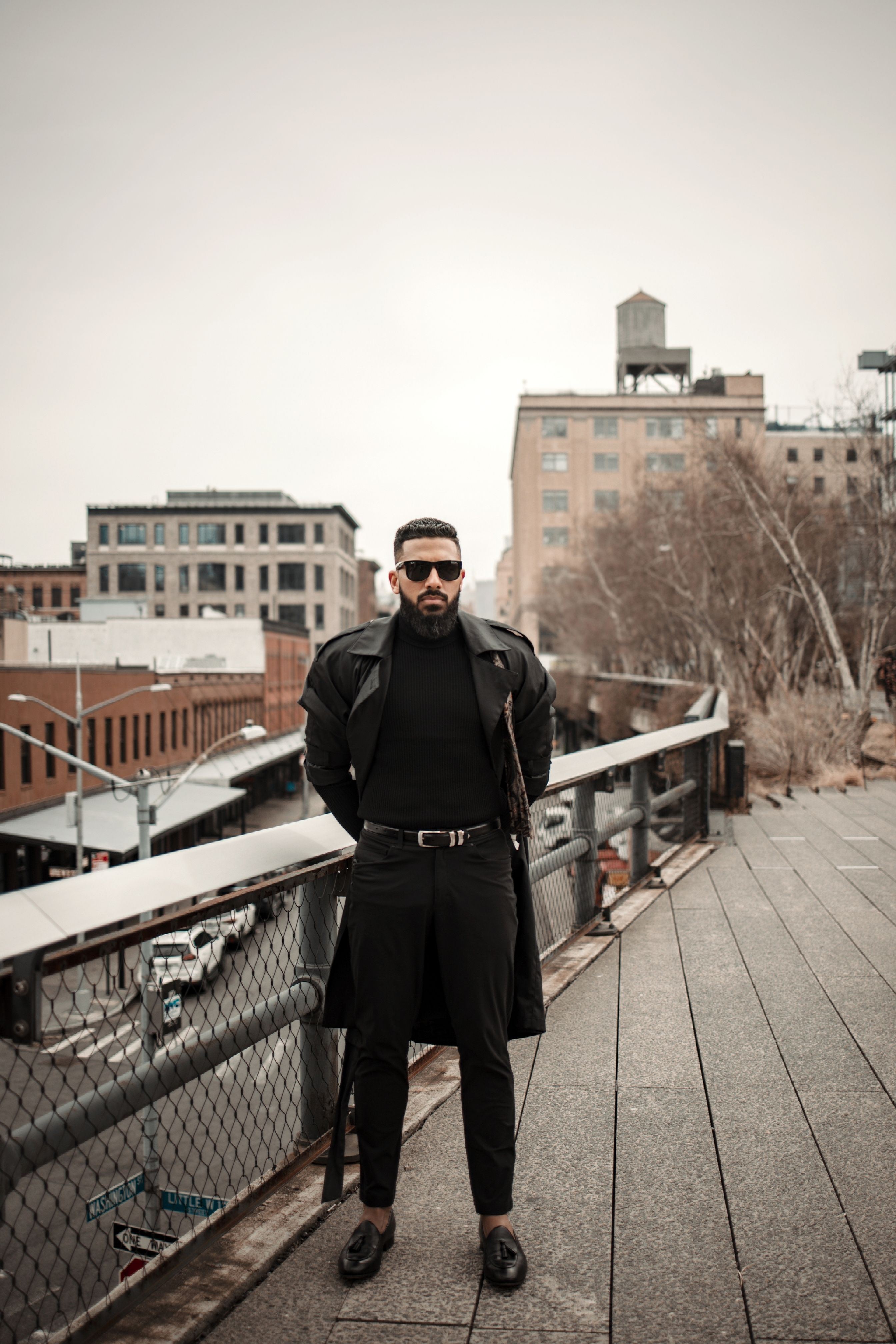 Stylish Man Standing on Urban Walkway · Free Stock Photo