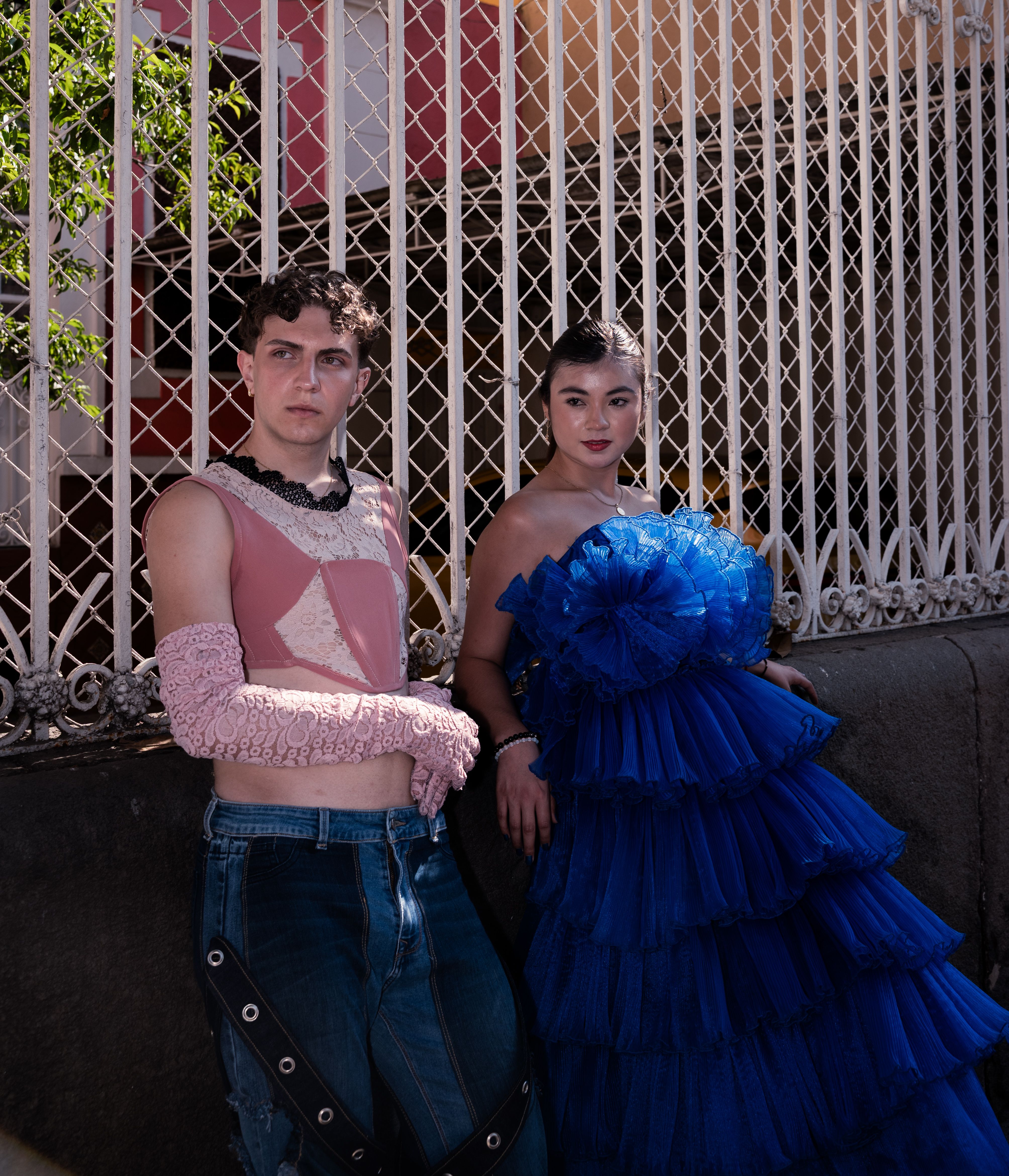 Stylish Duo in Vibrant and Edgy Fashion Outdoors · Free Stock Photo