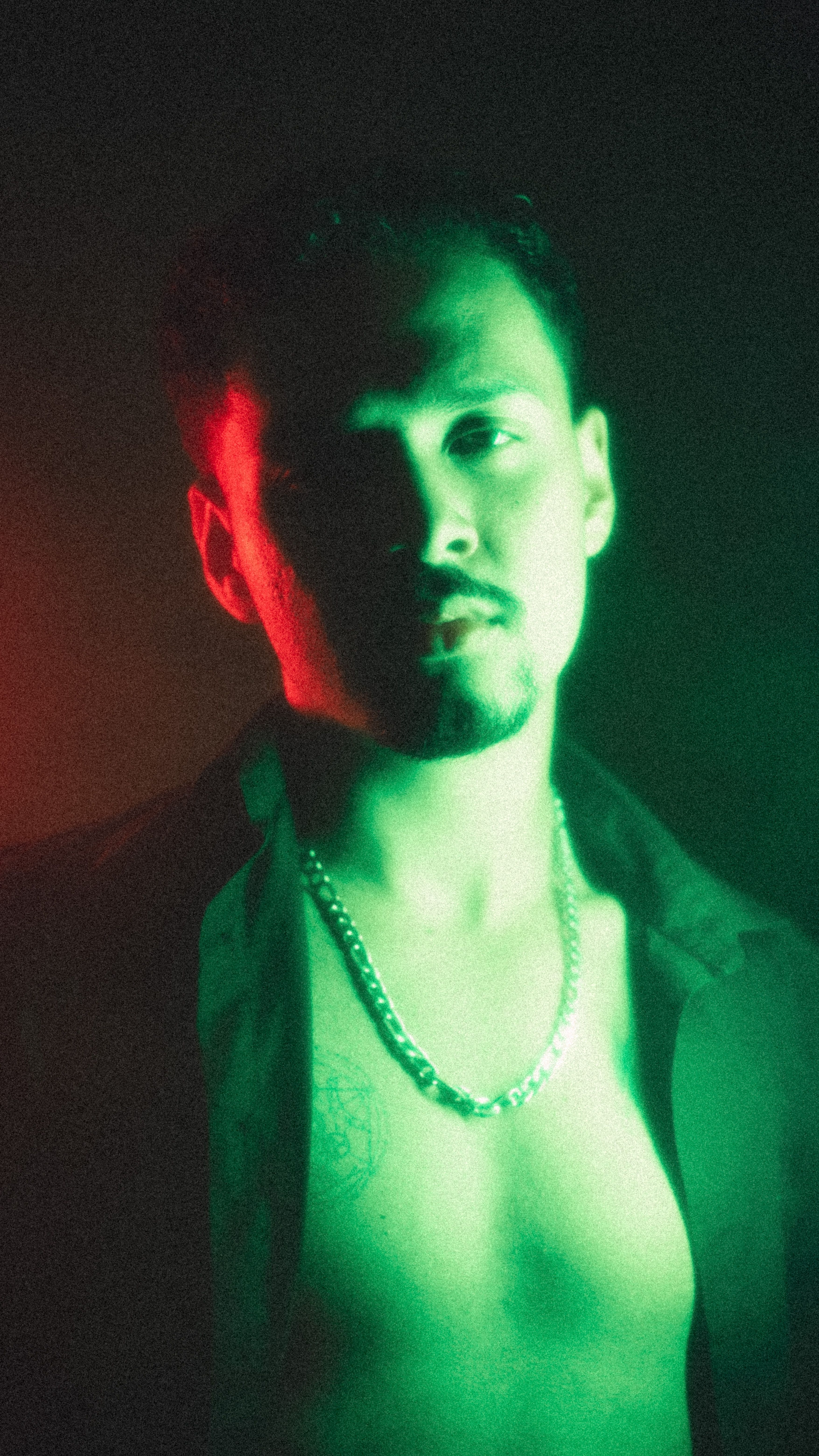 Moody Portrait of Man with Dramatic Lighting · Free Stock Photo
