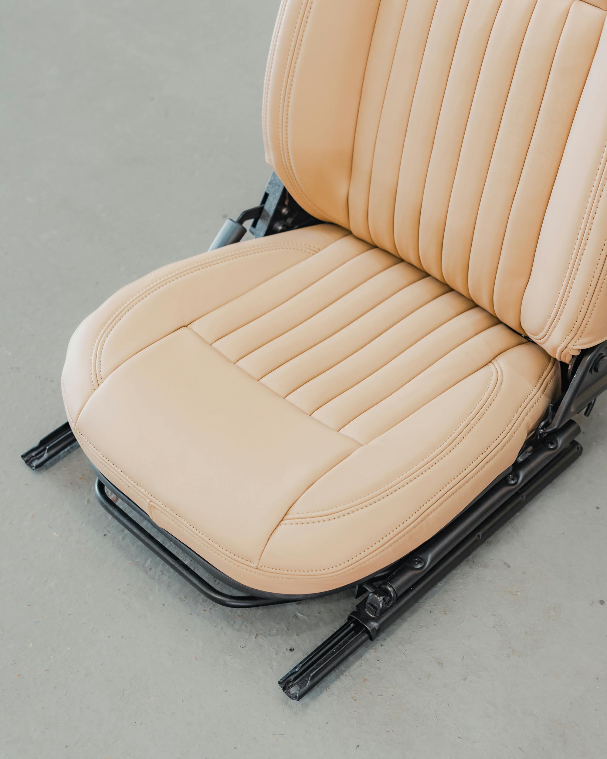 Luxury Beige Leather Car Seat on Display · Free Stock Photo
