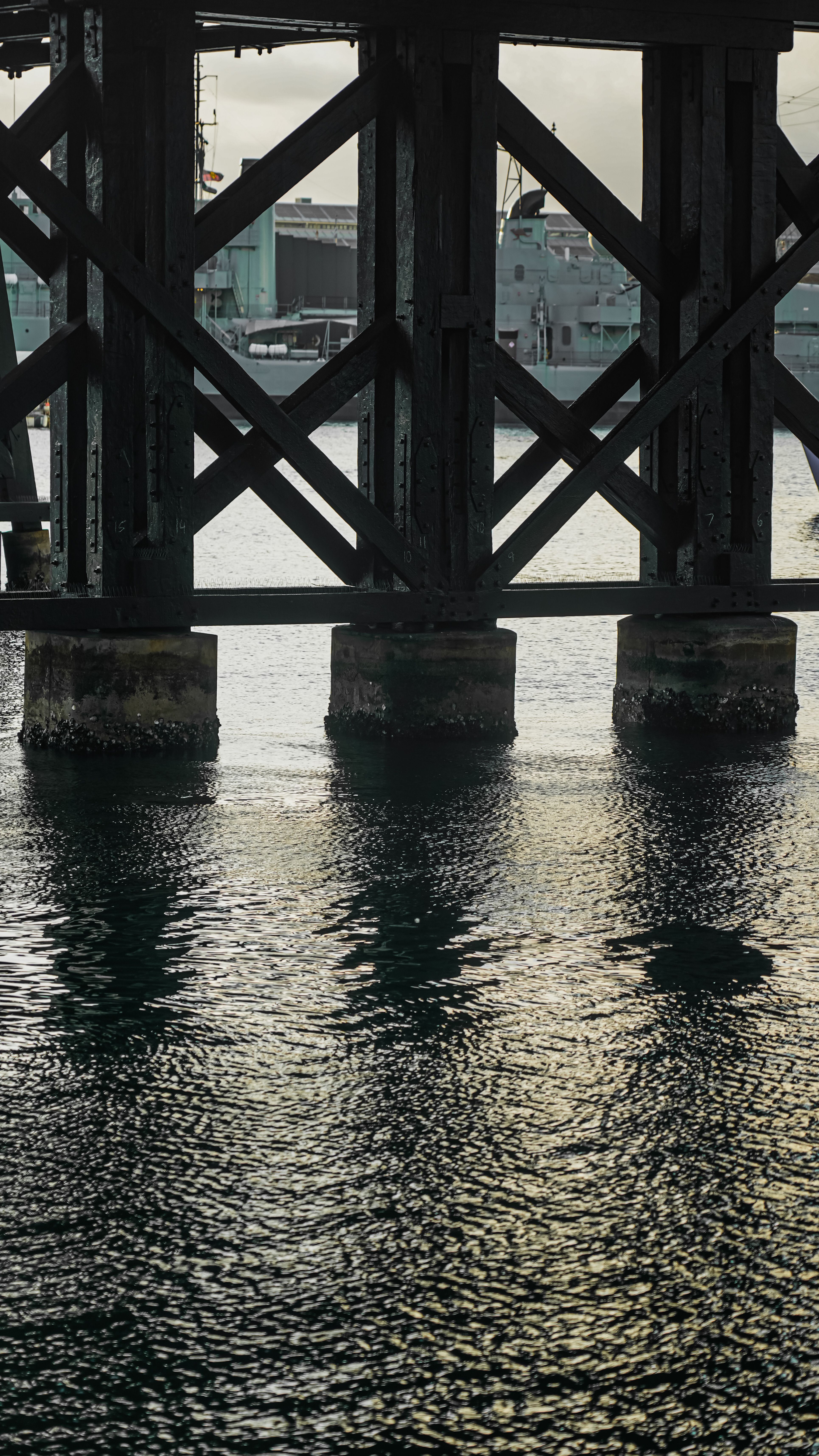 Bridge Reflections on Calm Water at Dusk · Free Stock Photo
