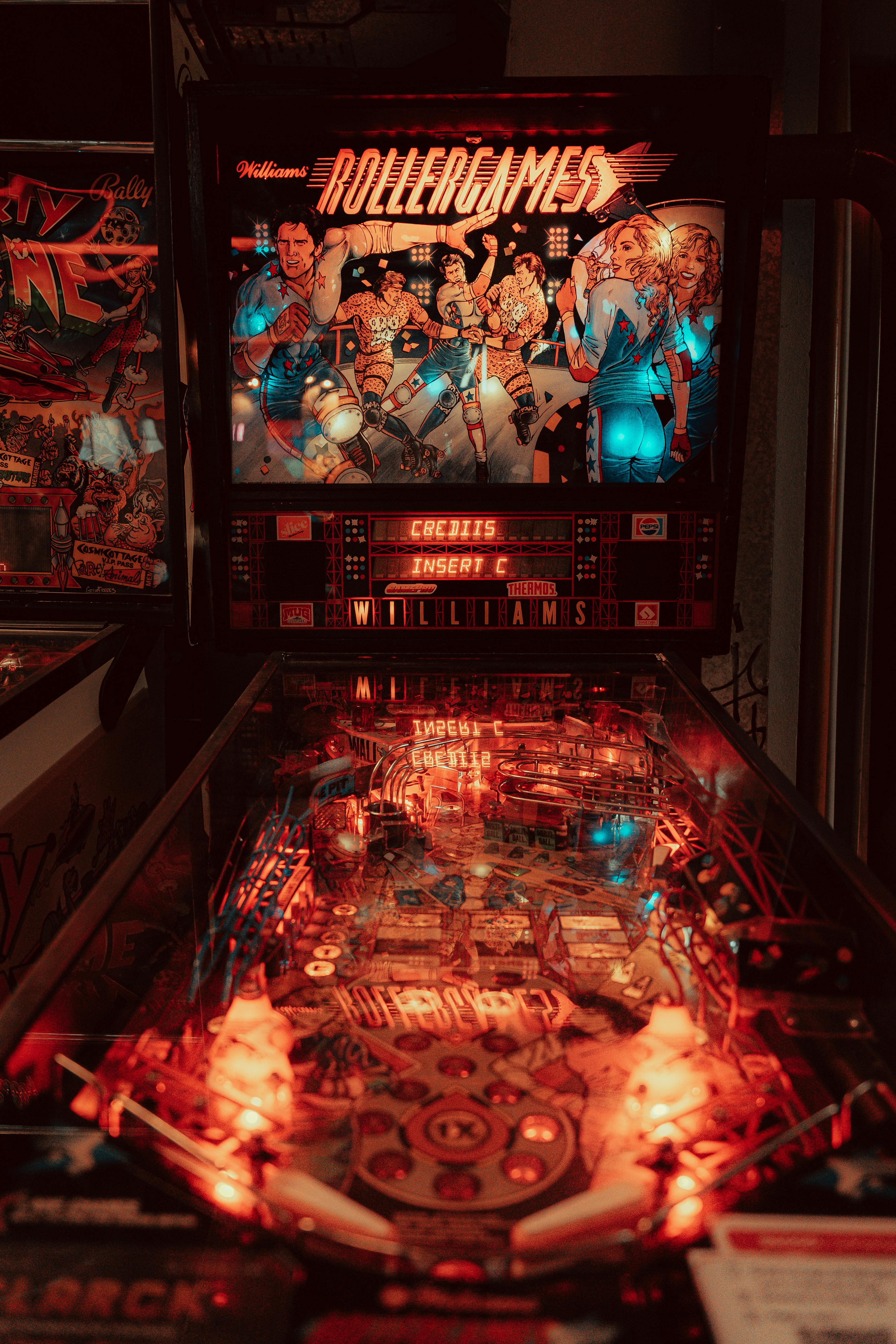 Vintage Rollergames Pinball Machine in Arcade · Free Stock Photo