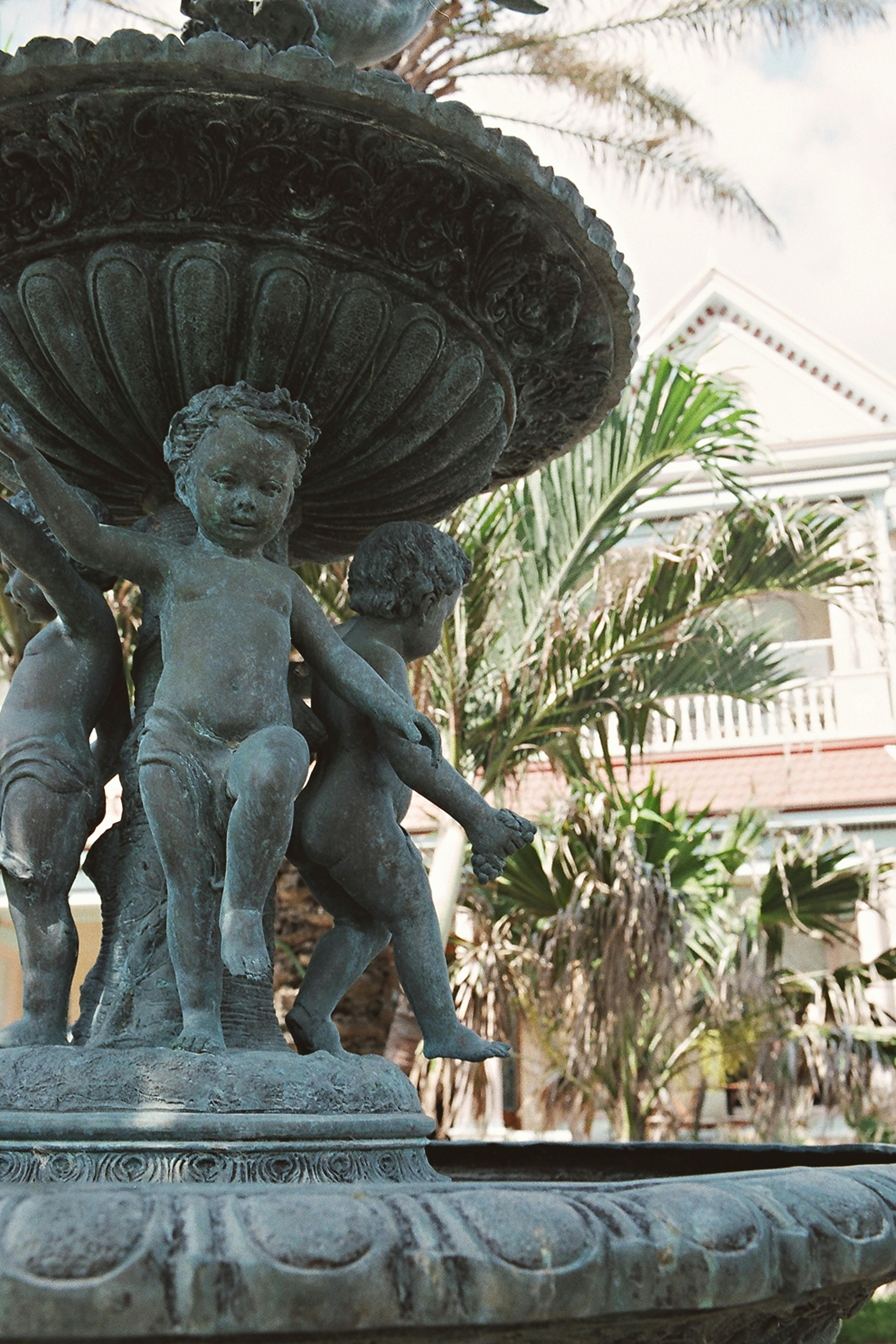 Vintage Fountain with Cherub Statues in Key West · Free Stock Photo