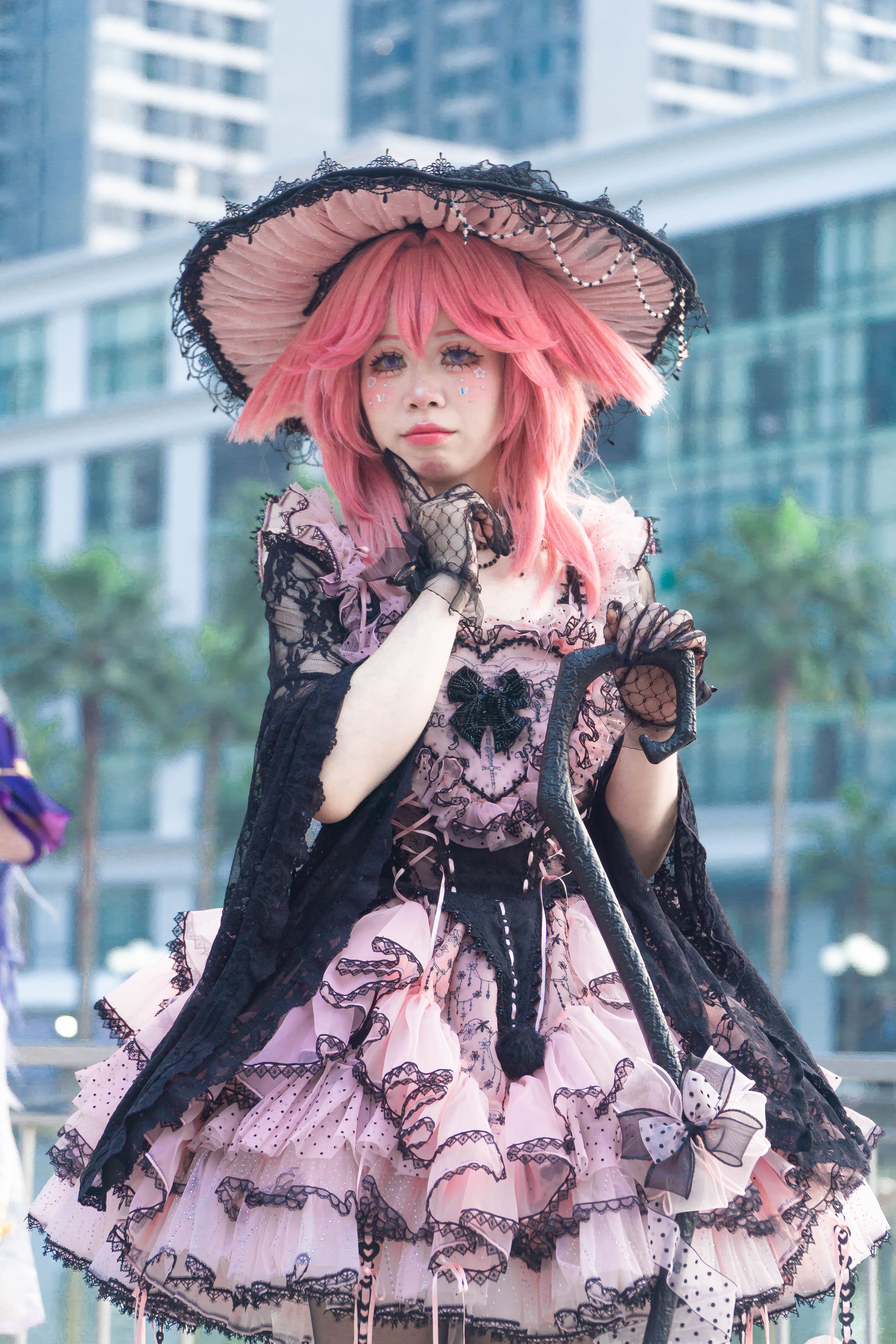Pink-haired Cosplay in Urban Setting · Free Stock Photo