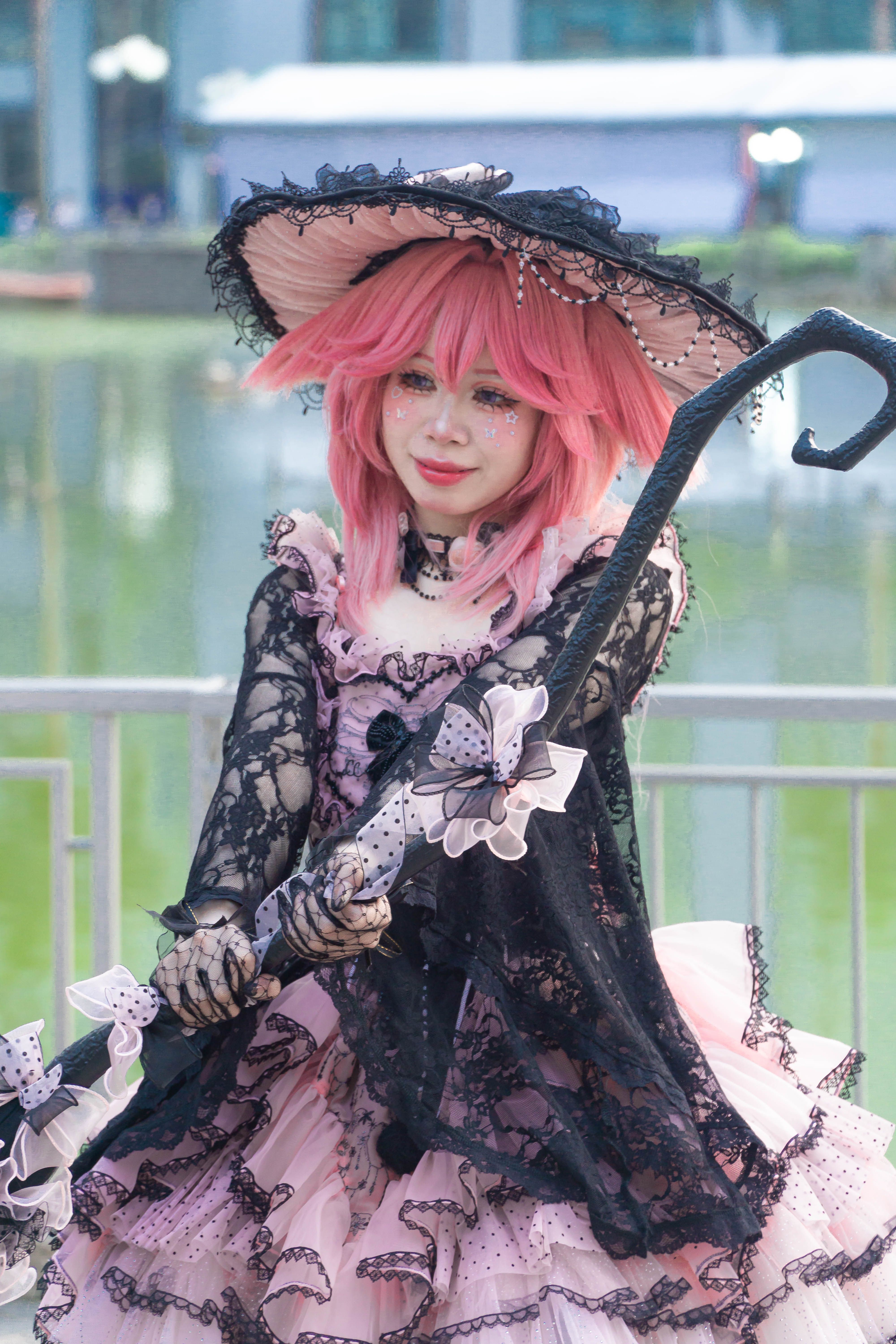 Young Woman in Elaborate Pink Cosplay · Free Stock Photo