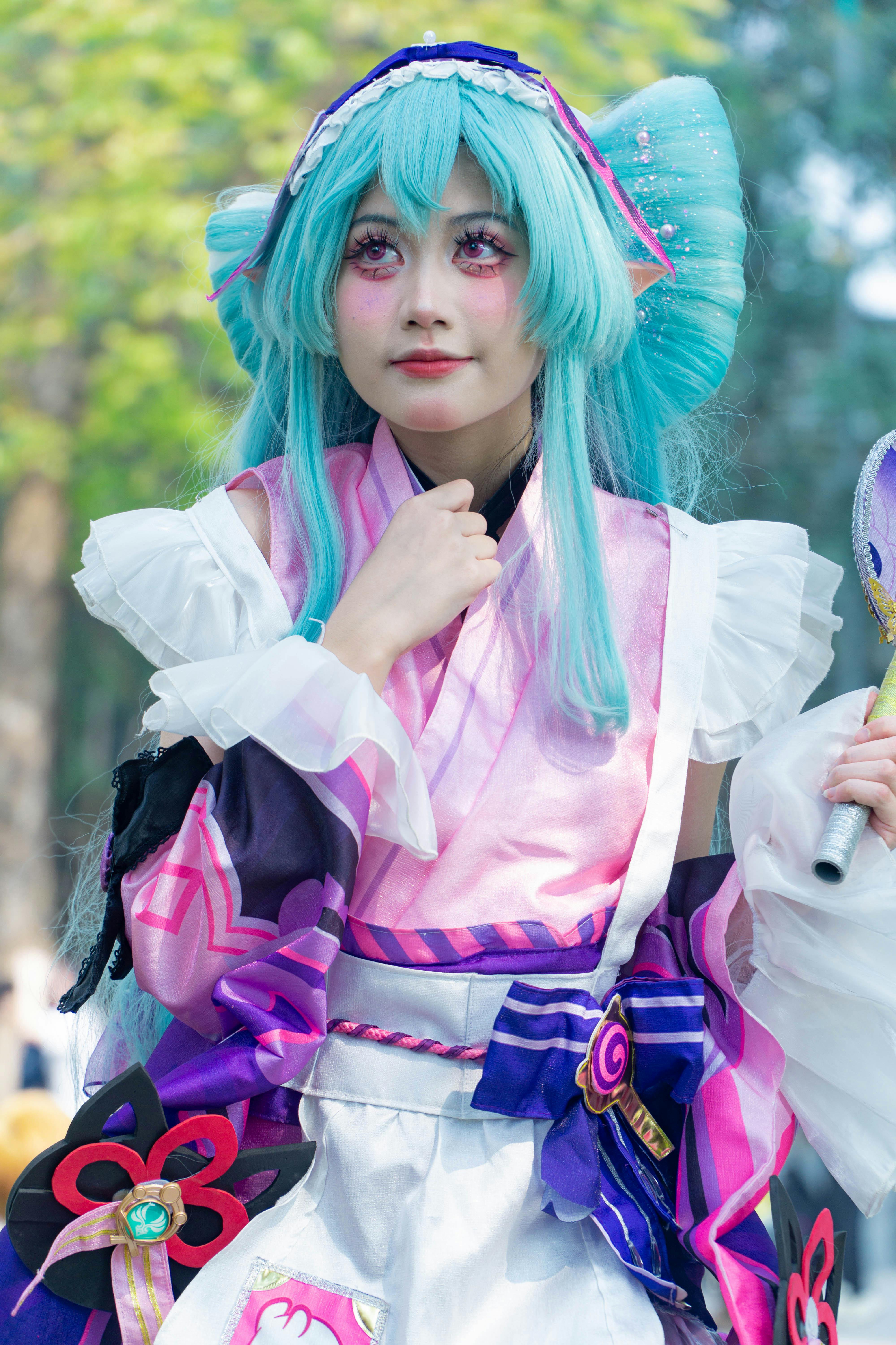 Colorful Cosplay Woman in Fantasy Costume Outdoors · Free Stock Photo